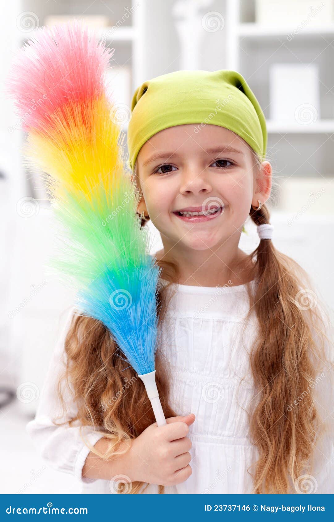 Little Girl with Dusting Brush Stock Photo - Image of holding, chores ...