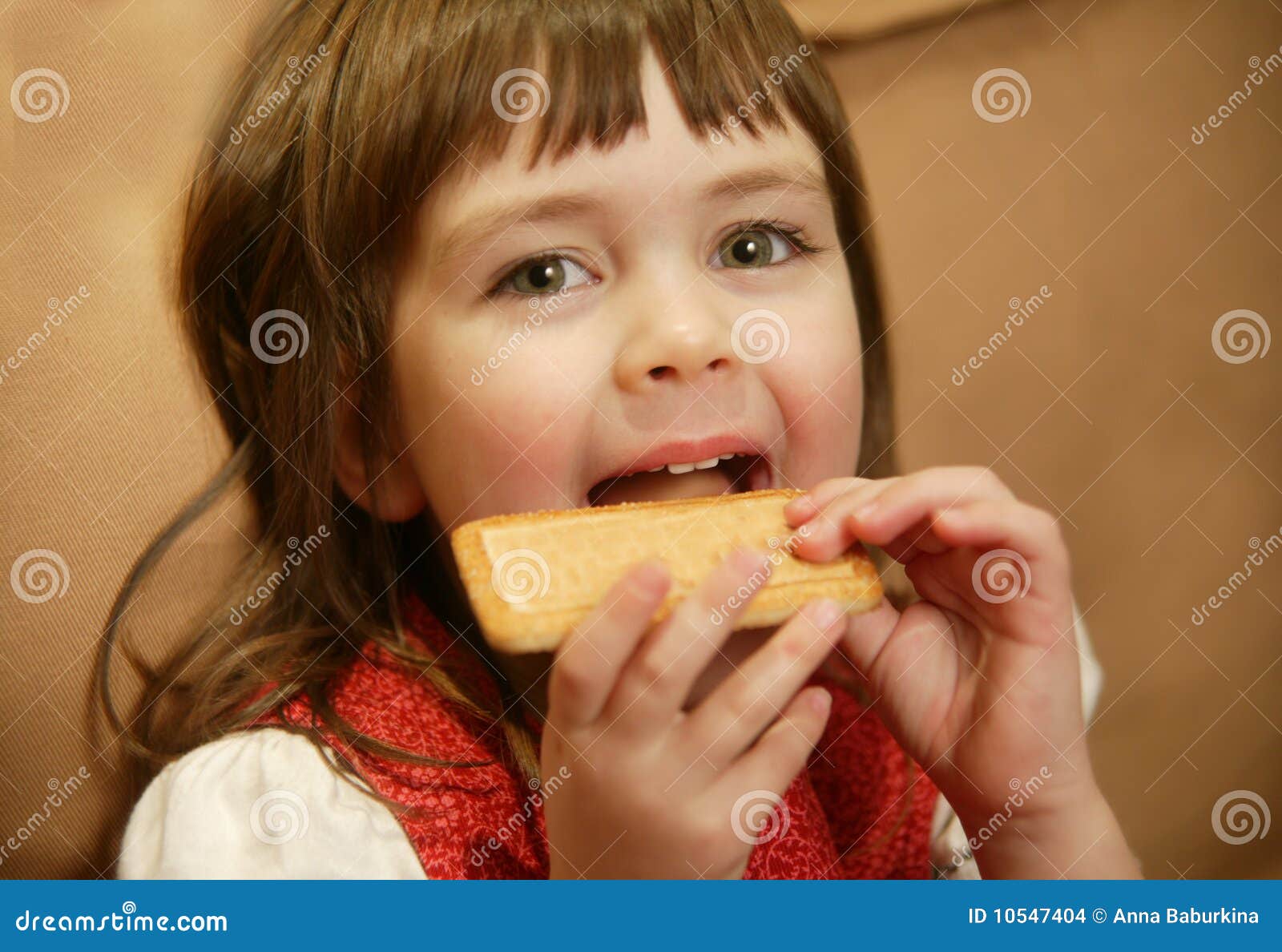 Little girl eating stock photo. Image of food, females - 10547404