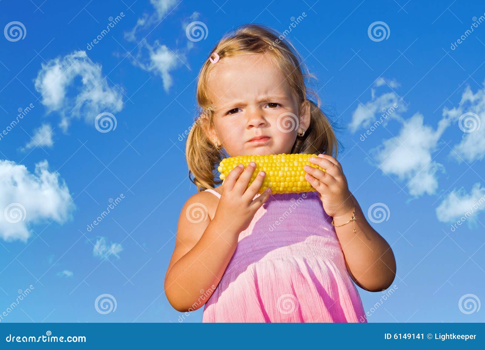 Little Girl Eating Cooked Sweet Corn Stock Image - Image of blue ...