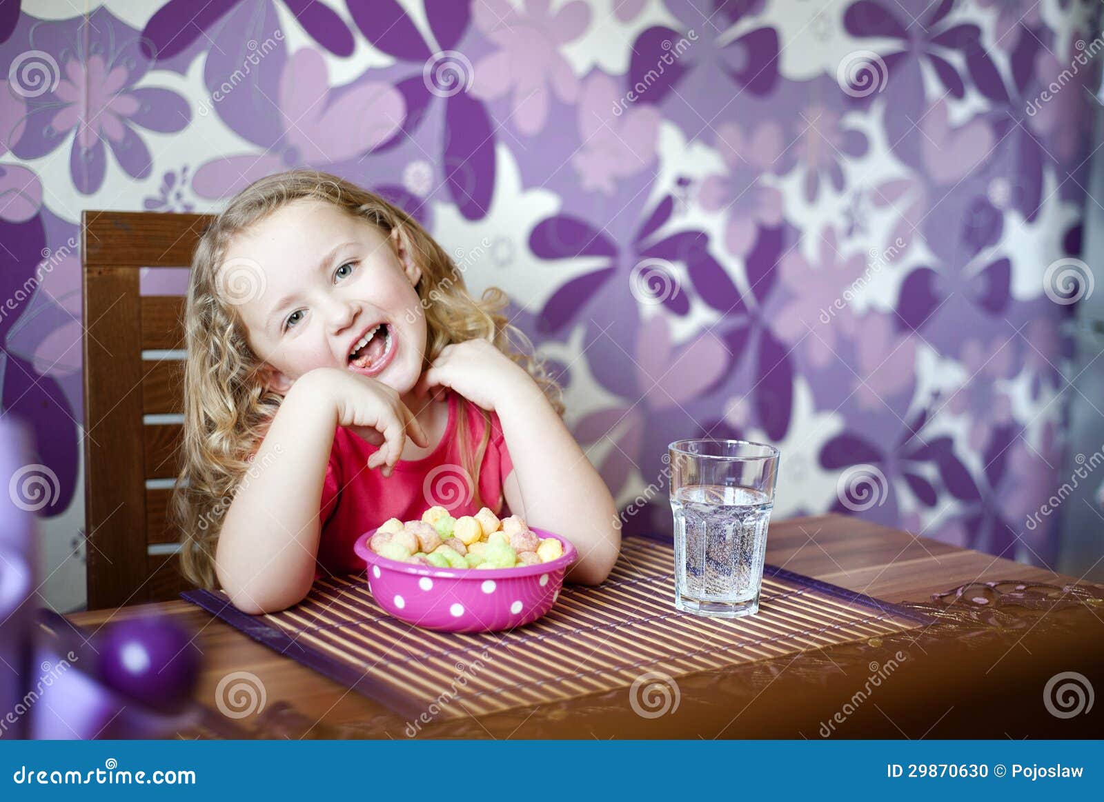 Little girl is eating stock photo. Image of dessert, bowl - 29870630