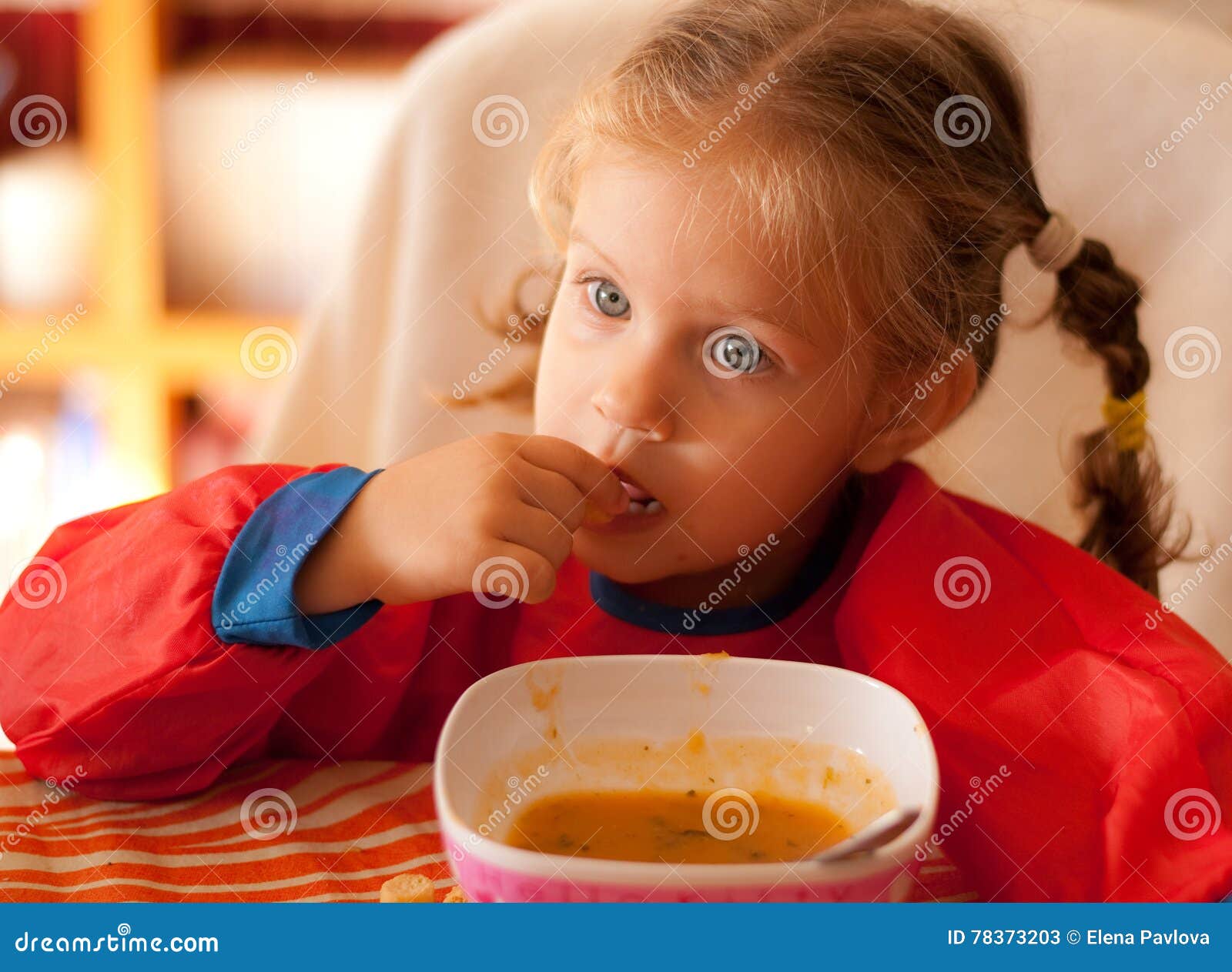 The little girl eating stock image. Image of mouth, little - 78373203