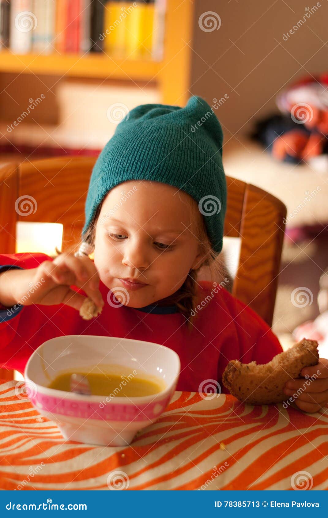 The little girl eating stock image. Image of beautiful - 78385713