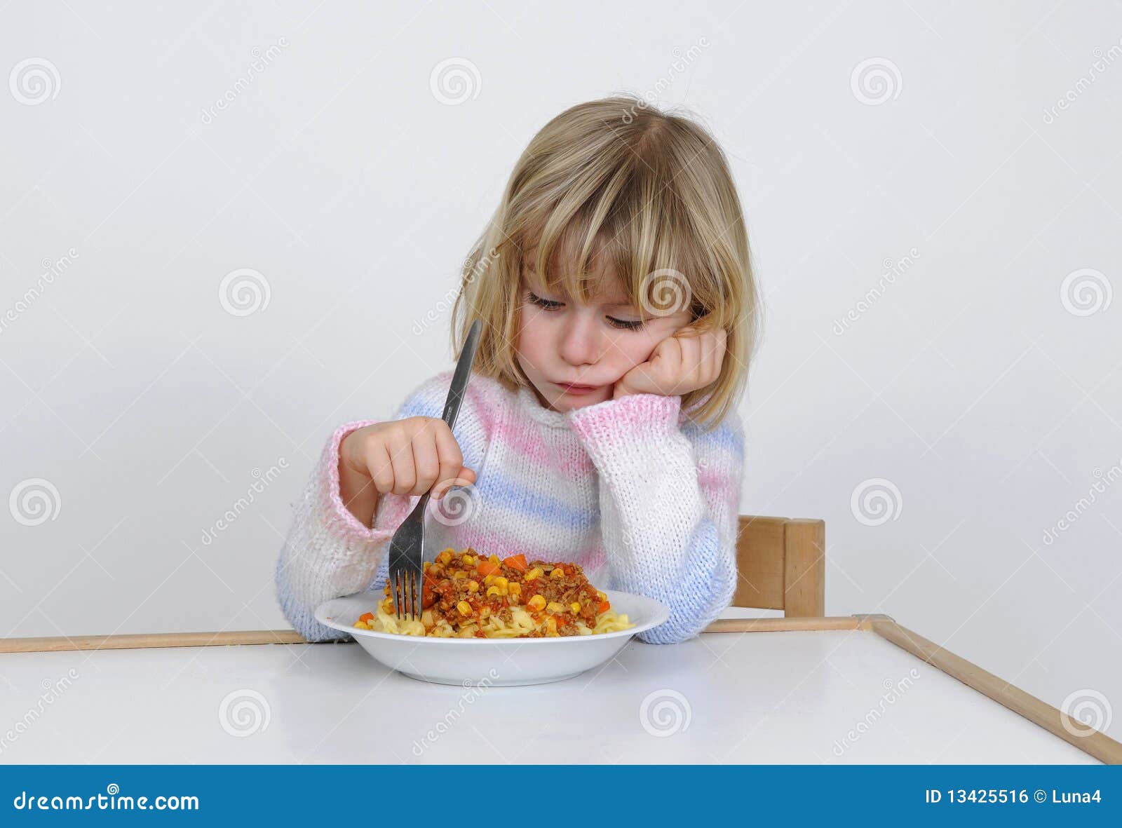 Little girl eats stock photo. Image of delicate, meal - 13425516