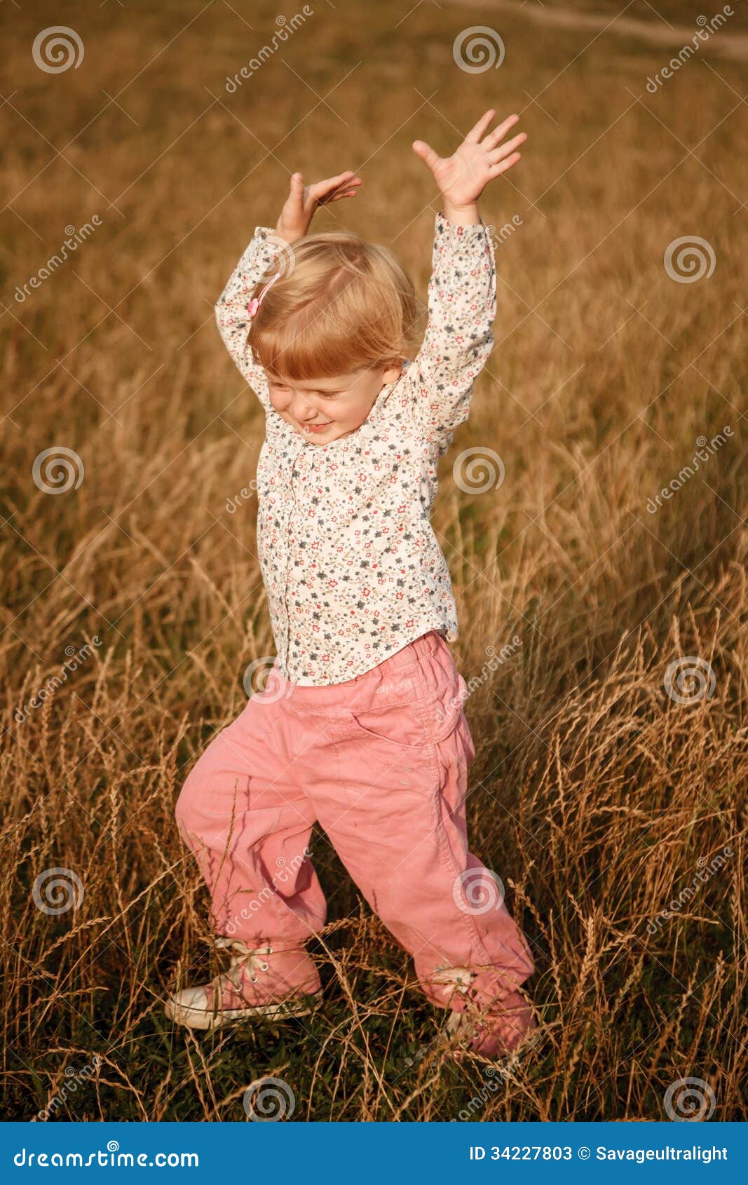 Little girl in the field stock image. Image of outside - 34227803