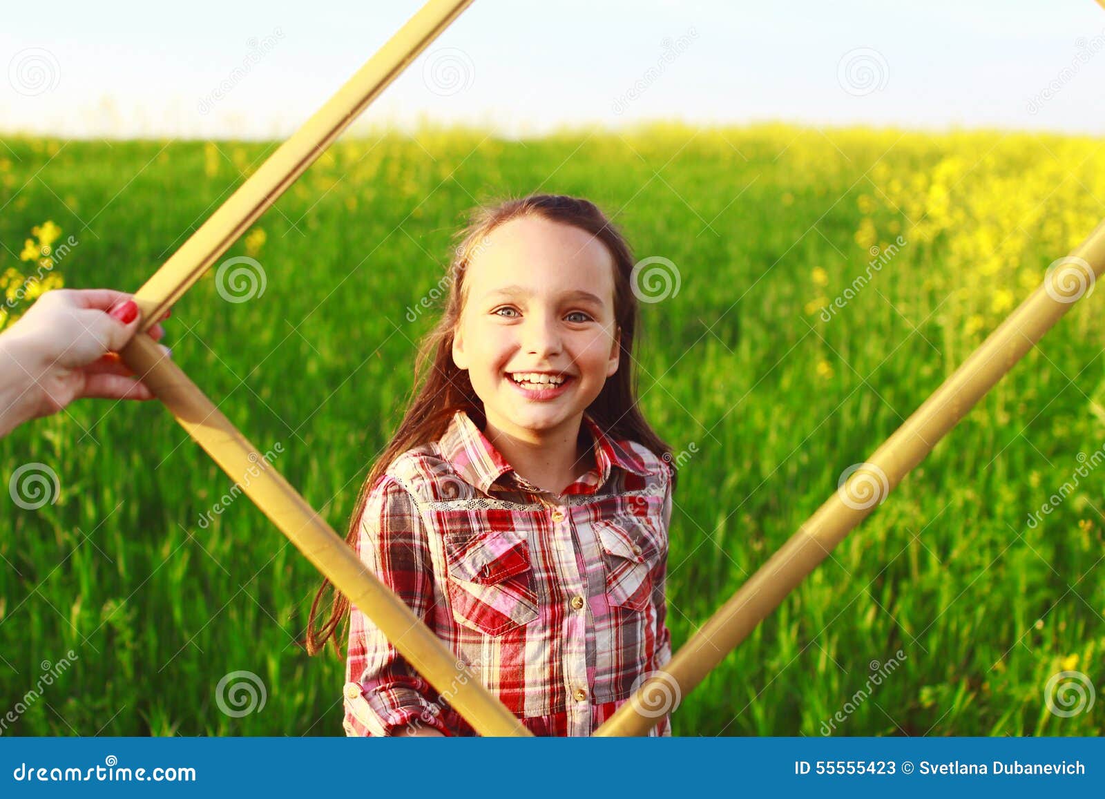 Little girl in the field stock image. Image of white - 55555423