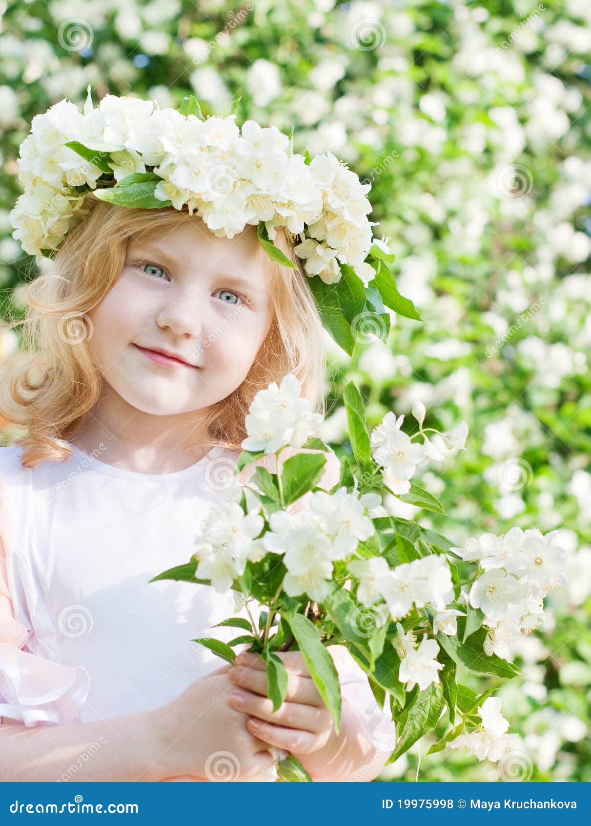 Little girl with flowers stock photo. Image of little - 19975998