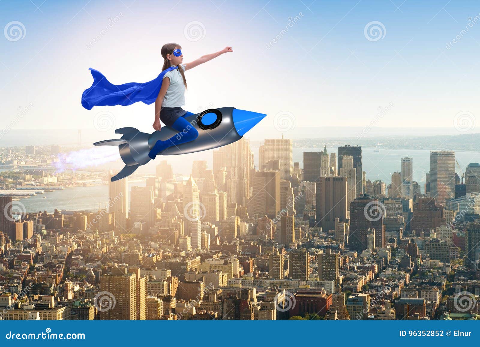 The Little Girl Flying Rocket in Superhero Concept Stock Photo - Image ...
