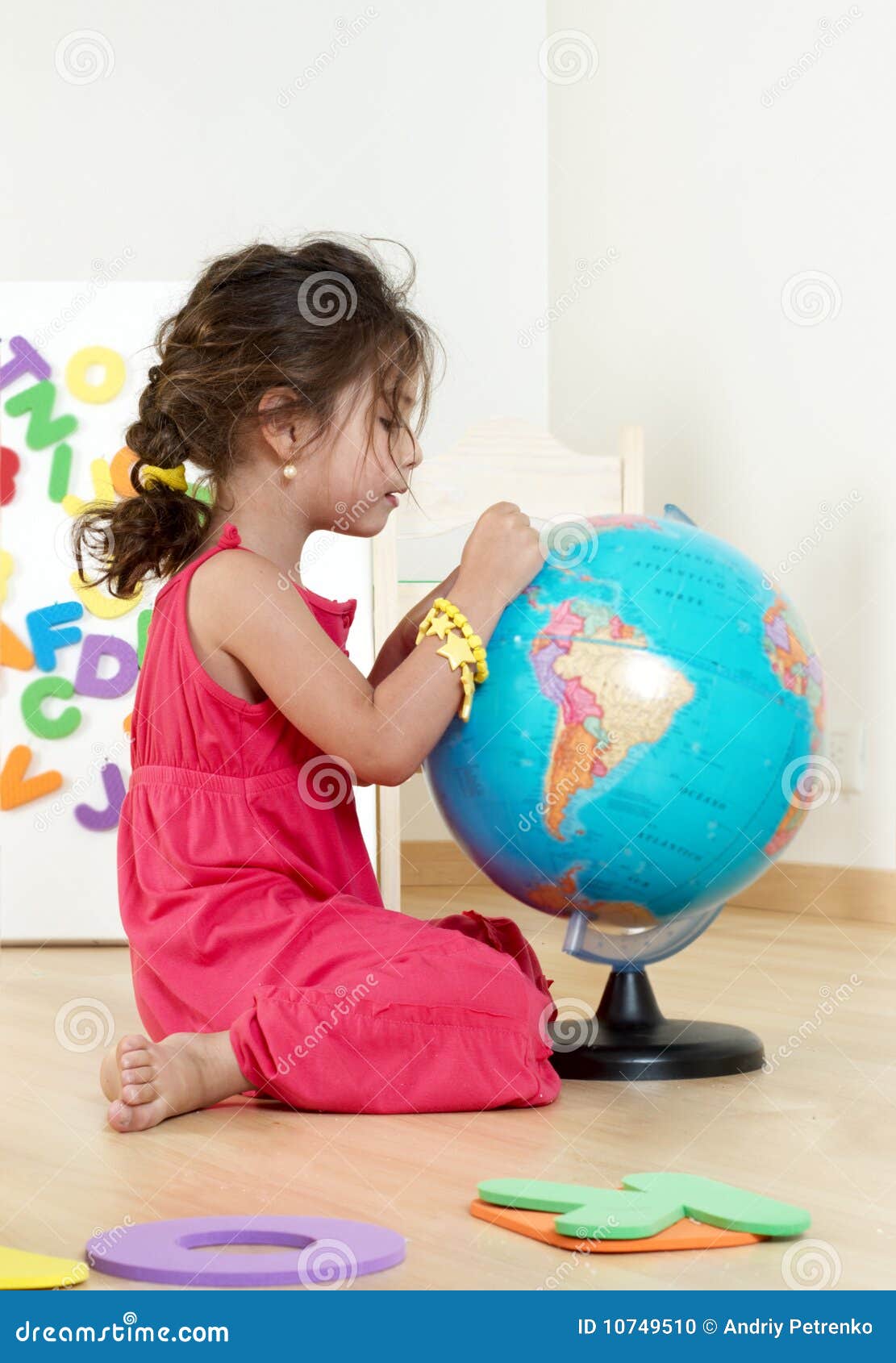 The little girl with globe stock photo. Image of happy - 10749510 The little girl with globe stock photo. Image of happy - 10749510