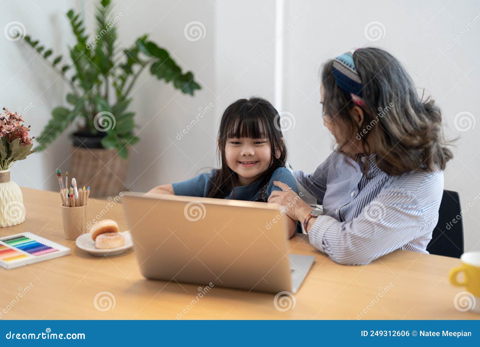 Little Girl with Grandmother Using Laptop Computer, E Learning on ...
