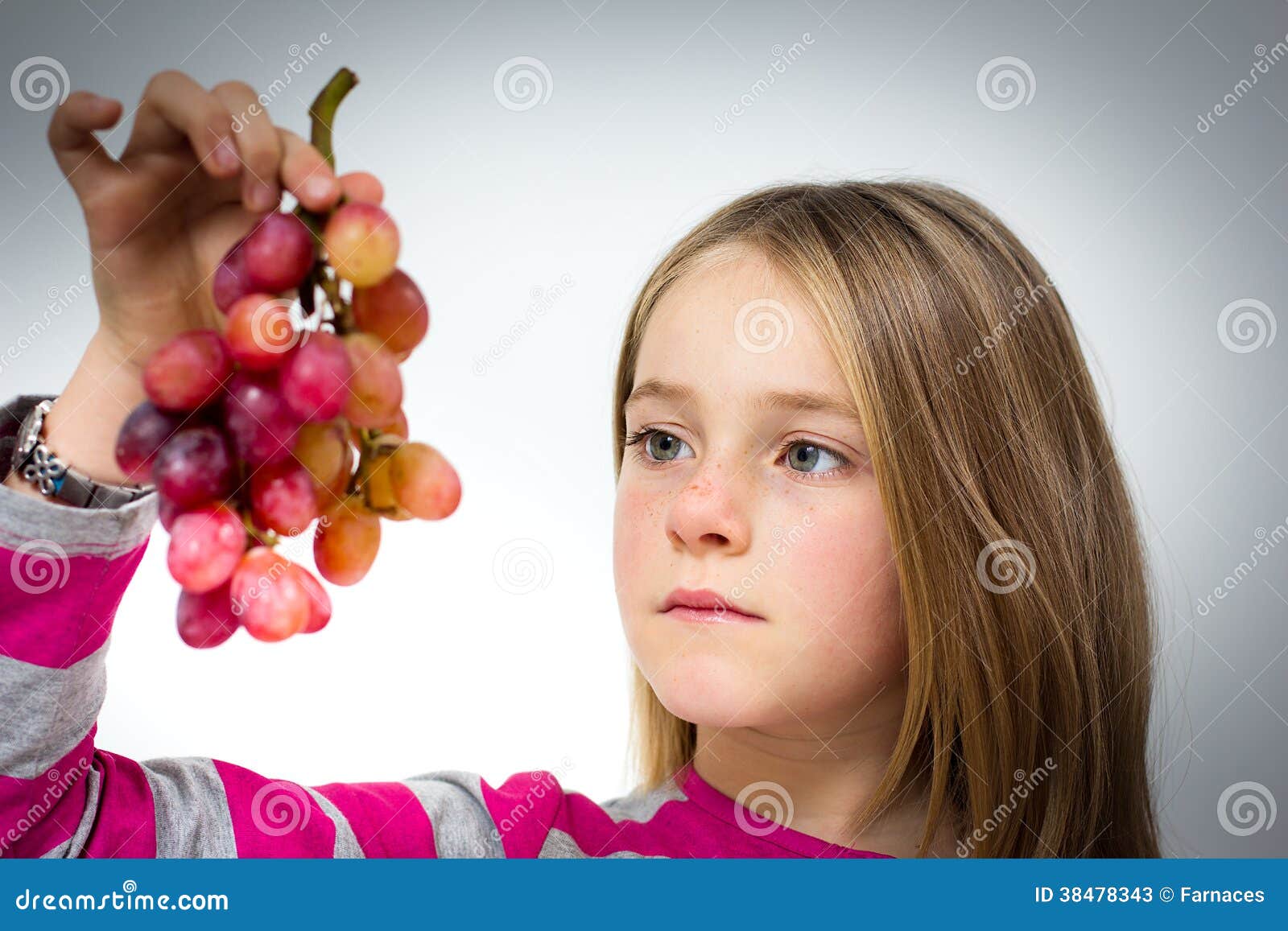 Little girl with grapes stock image. Image of happy, grapes - 38478343