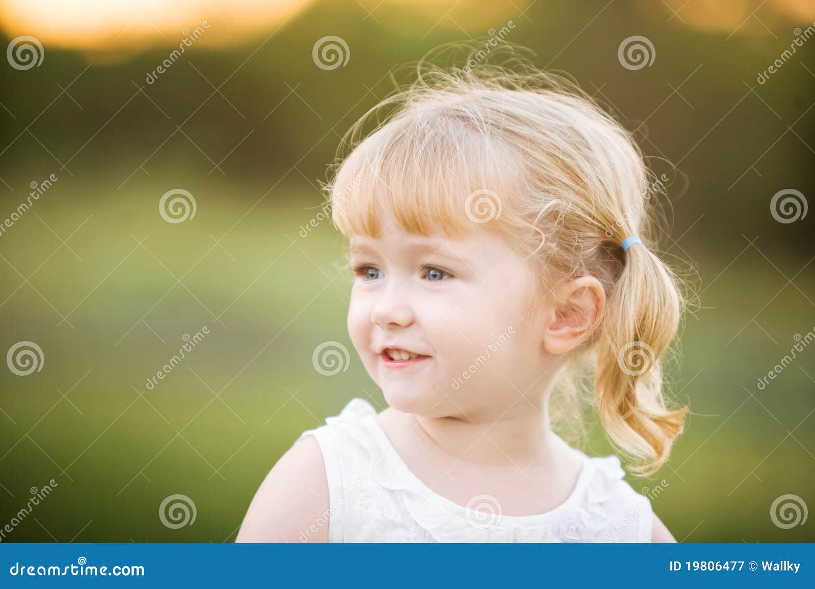 A Little Girl with a Happy Relaxed Expression Stock Image - Image of ...