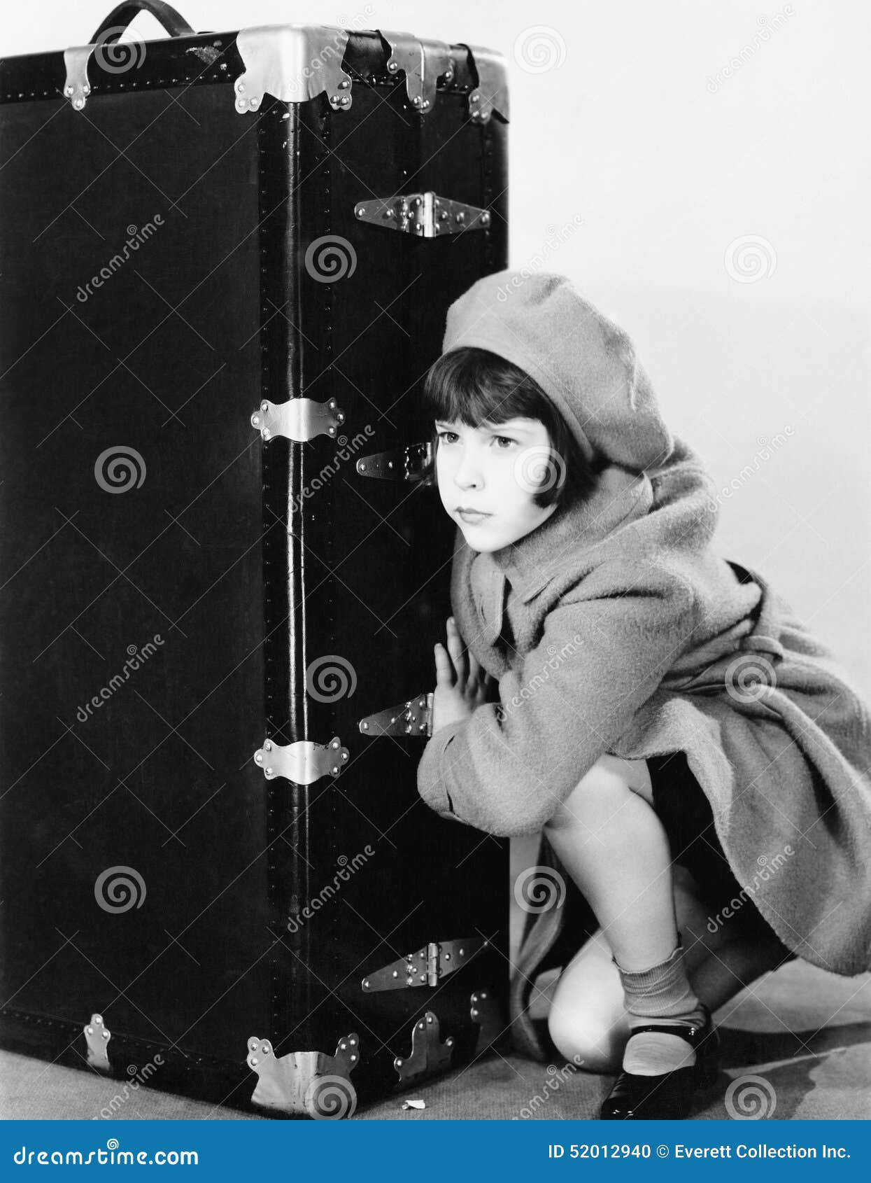 Photograph Of Crouching Woman Dressed In Black Blonde Looking Behind ...