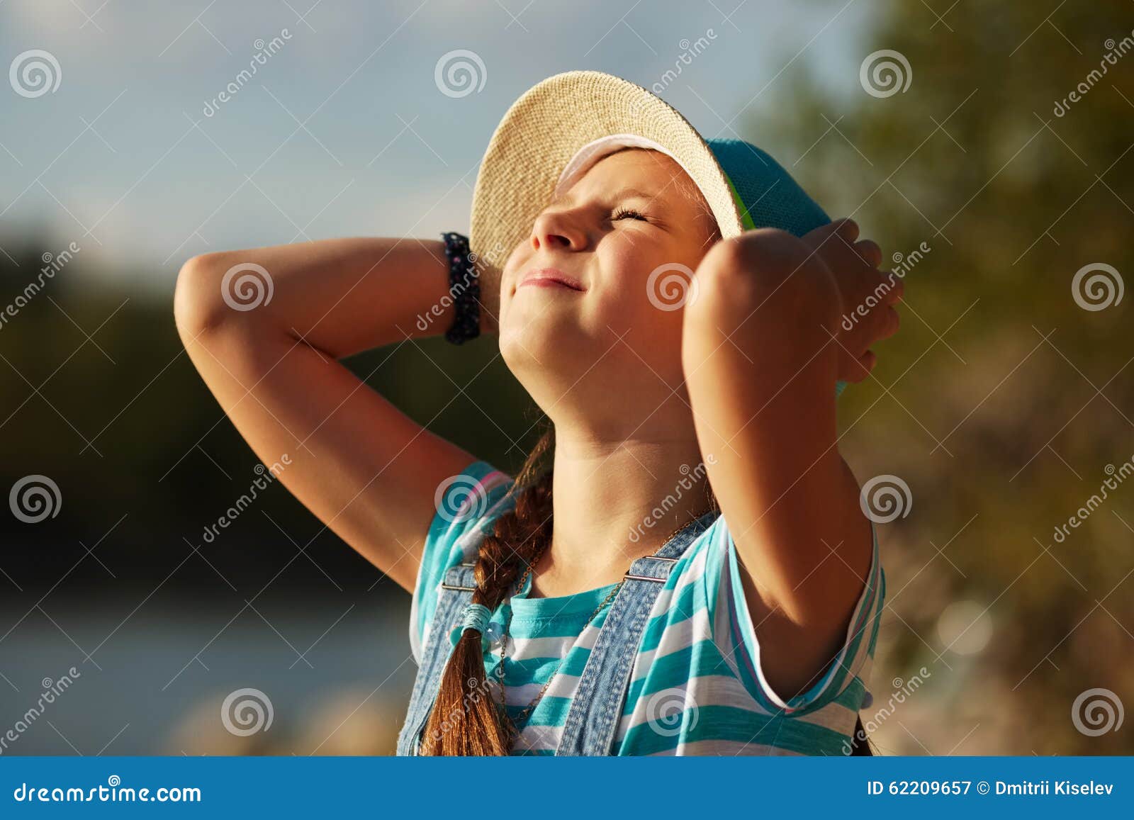 Little Girl in a Hat Squinting from the Sun Stock Image - Image of ...