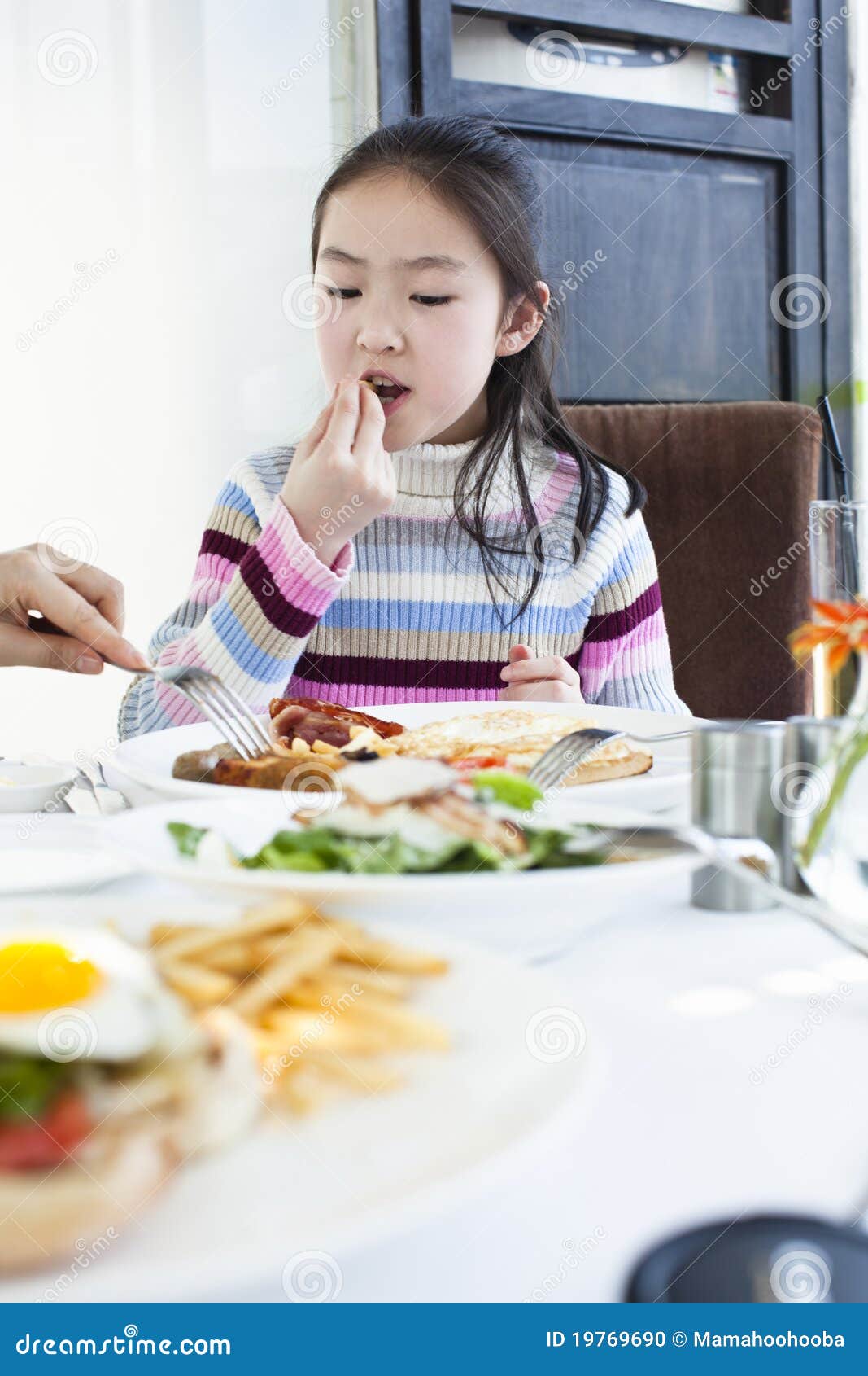Little Girl Having a Big Breakfast Stock Photo - Image of food ...