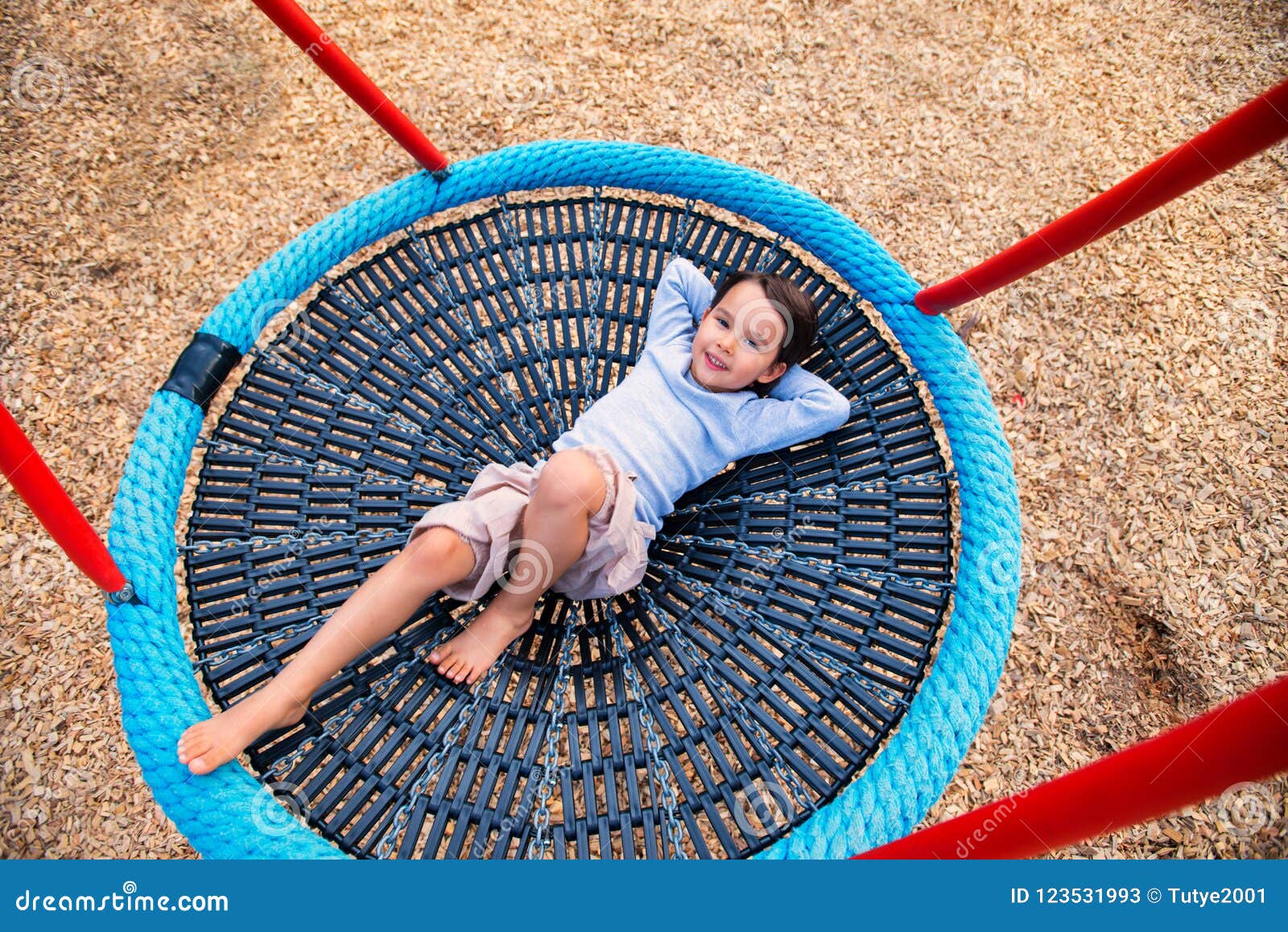 Little Girl Having Fun in One Rounded Swing Stock Image - Image of park ...