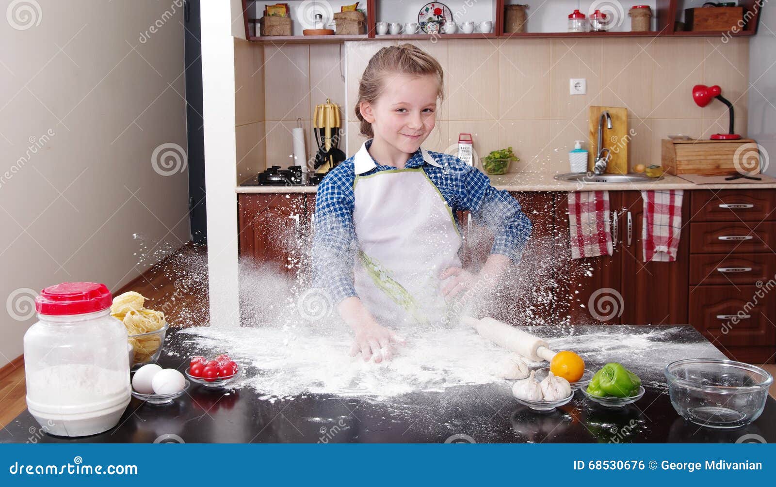 Little Girl is Helping To Bake in a Messy Kitchen Stock Photo - Image ...