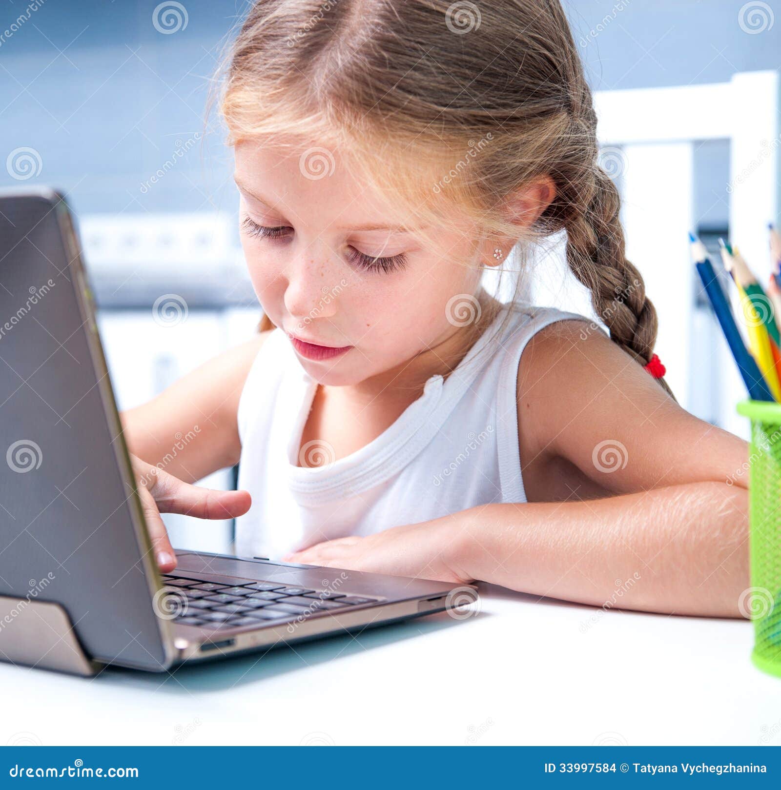 Little Girl with Her Computer Stock Photo - Image of people, classroom ...