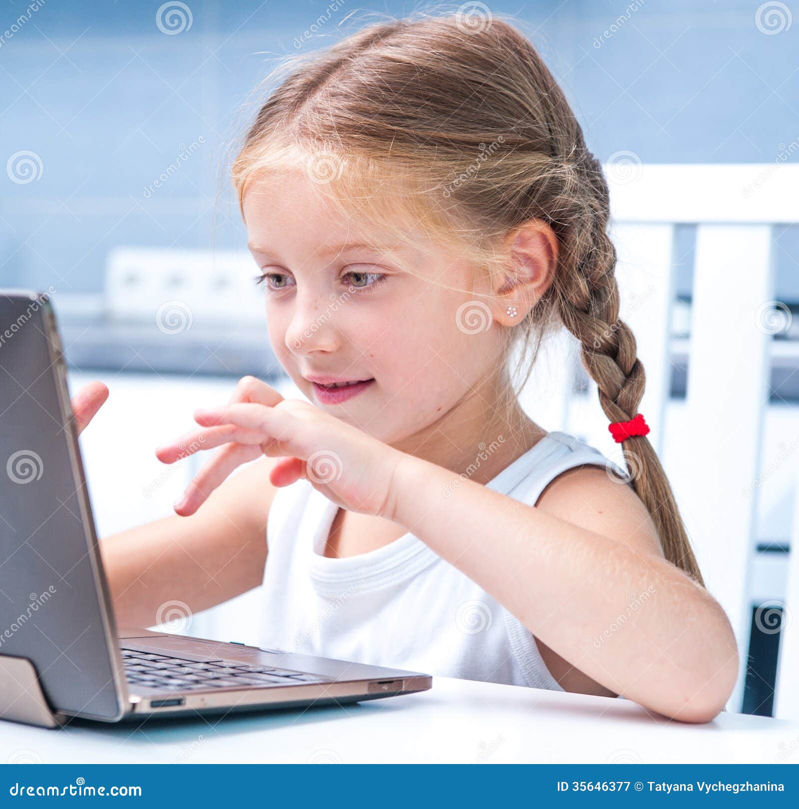 Little Girl with Her Computer Stock Image - Image of education, person ...