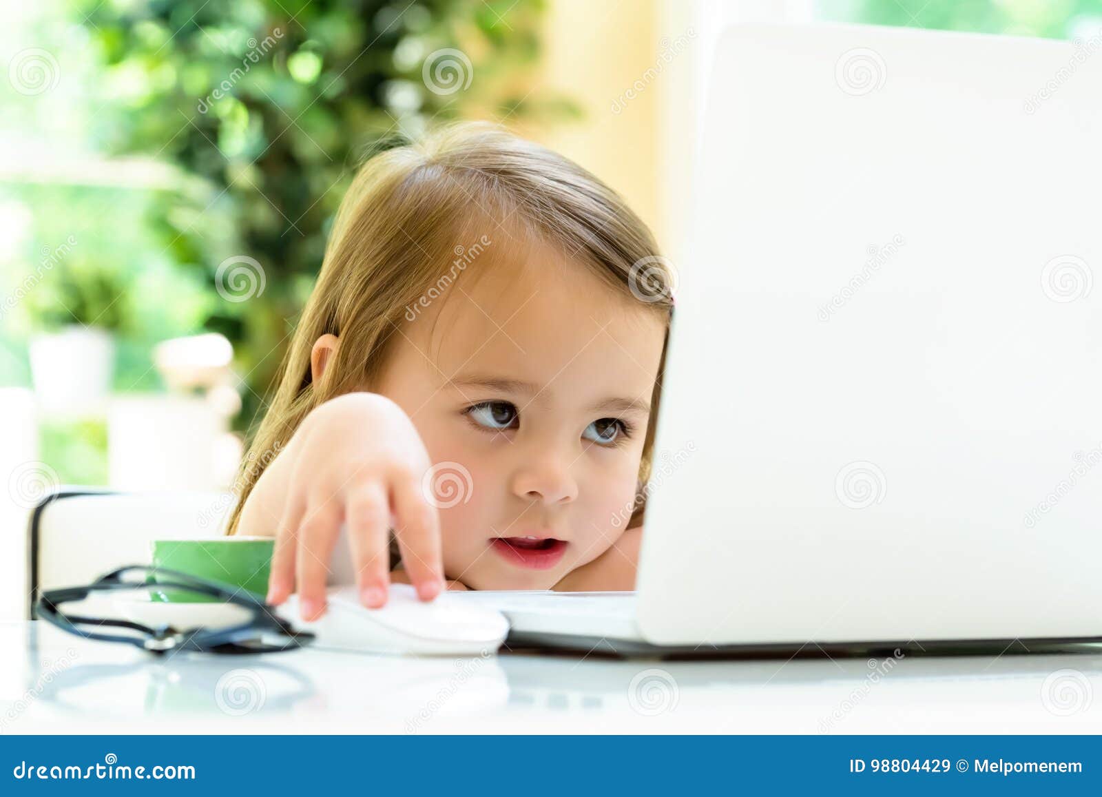 Little Girl at Her Computer at Home Stock Image - Image of laptop ...