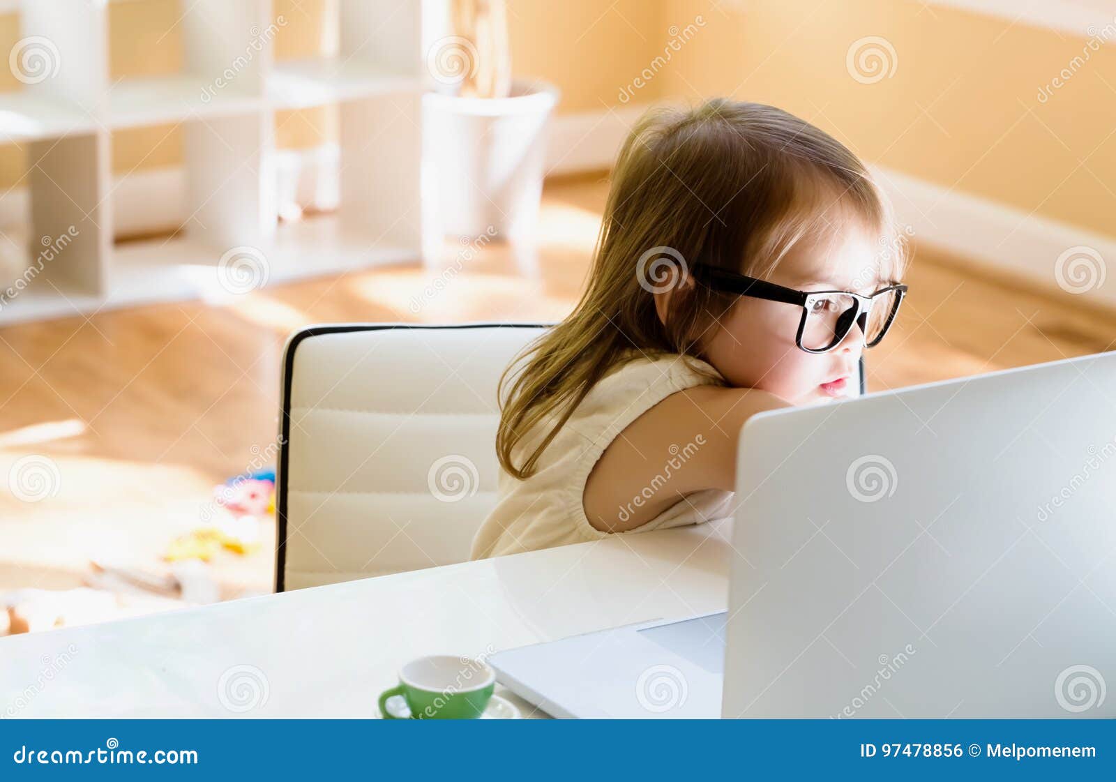 Little Girl at Her Desk at Home Stock Photo - Image of cute, laptop ...