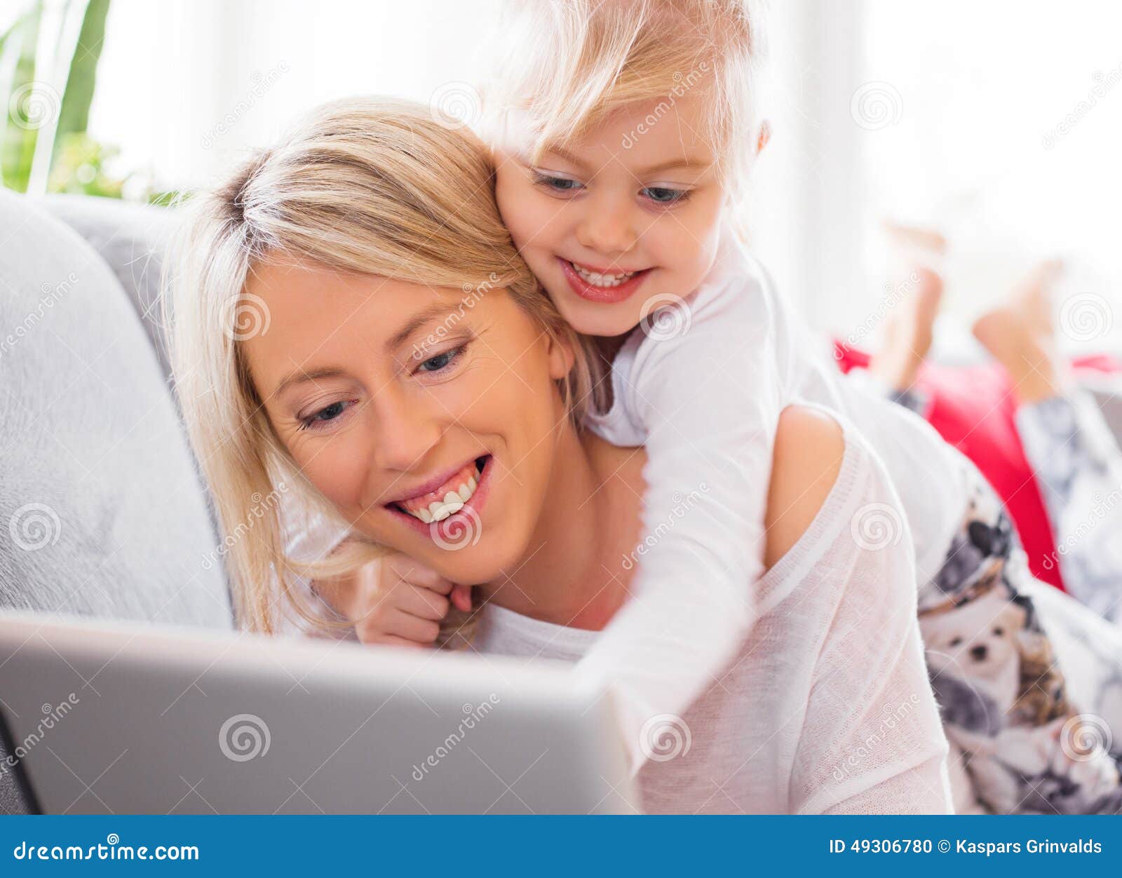 Little Girl with Her Mother Using Tablet Computer Stock Photo - Image ...