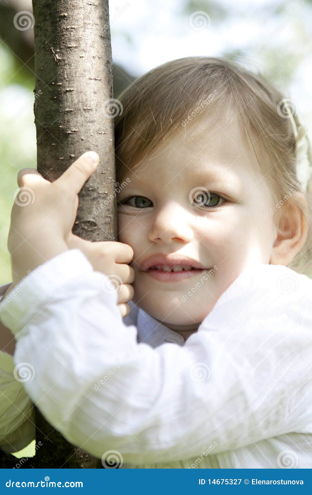 Little girl hold for tree stock image. Image of smile - 14675327
