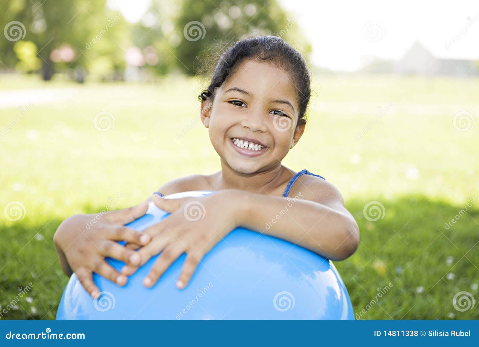 Little Girl Holding Blue Ball Stock Photo - Image of ball, outside ...