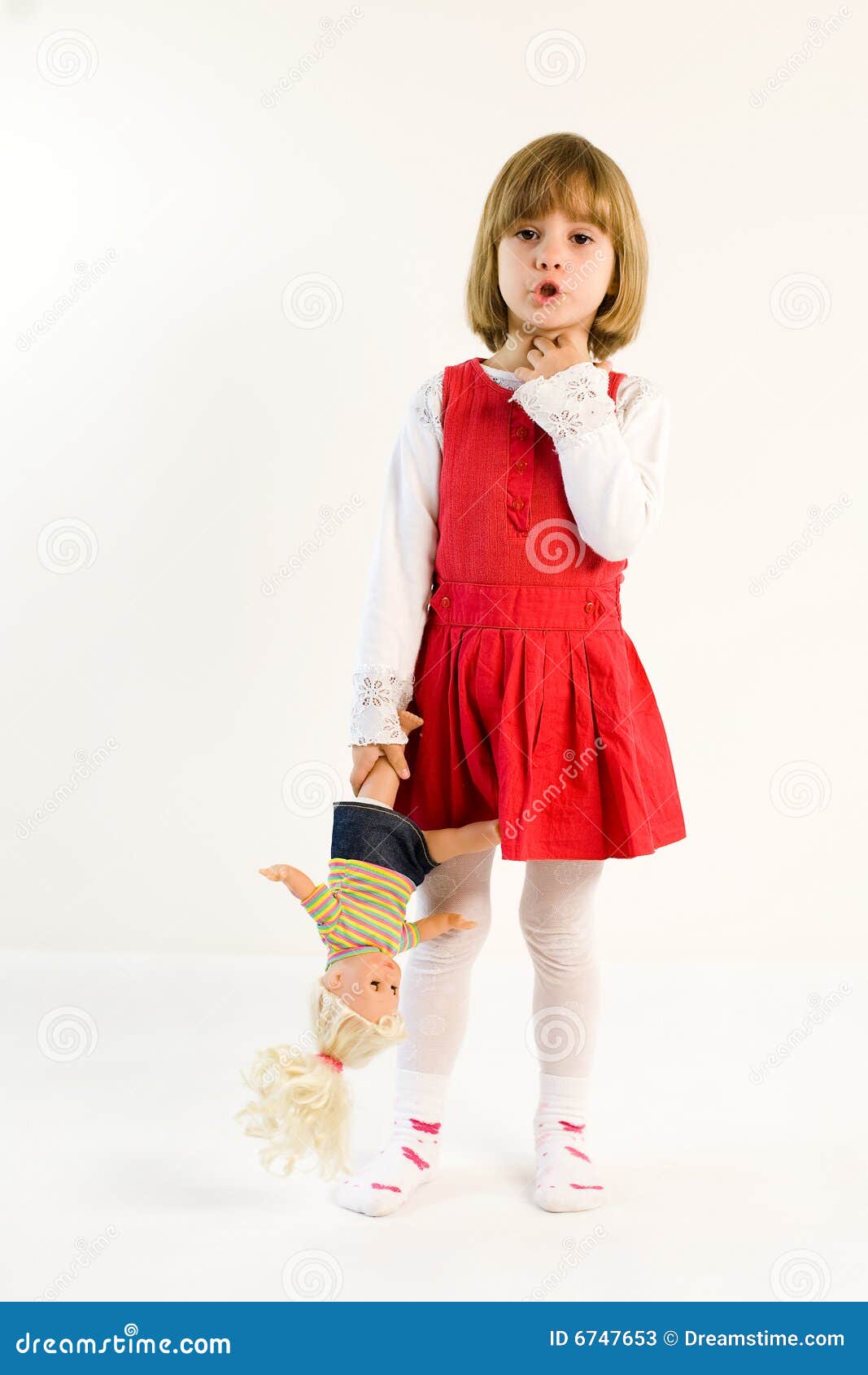 Little girl holding doll stock image. Image of expression - 6747653 Little girl holding doll stock image. Image of expression - 6747653