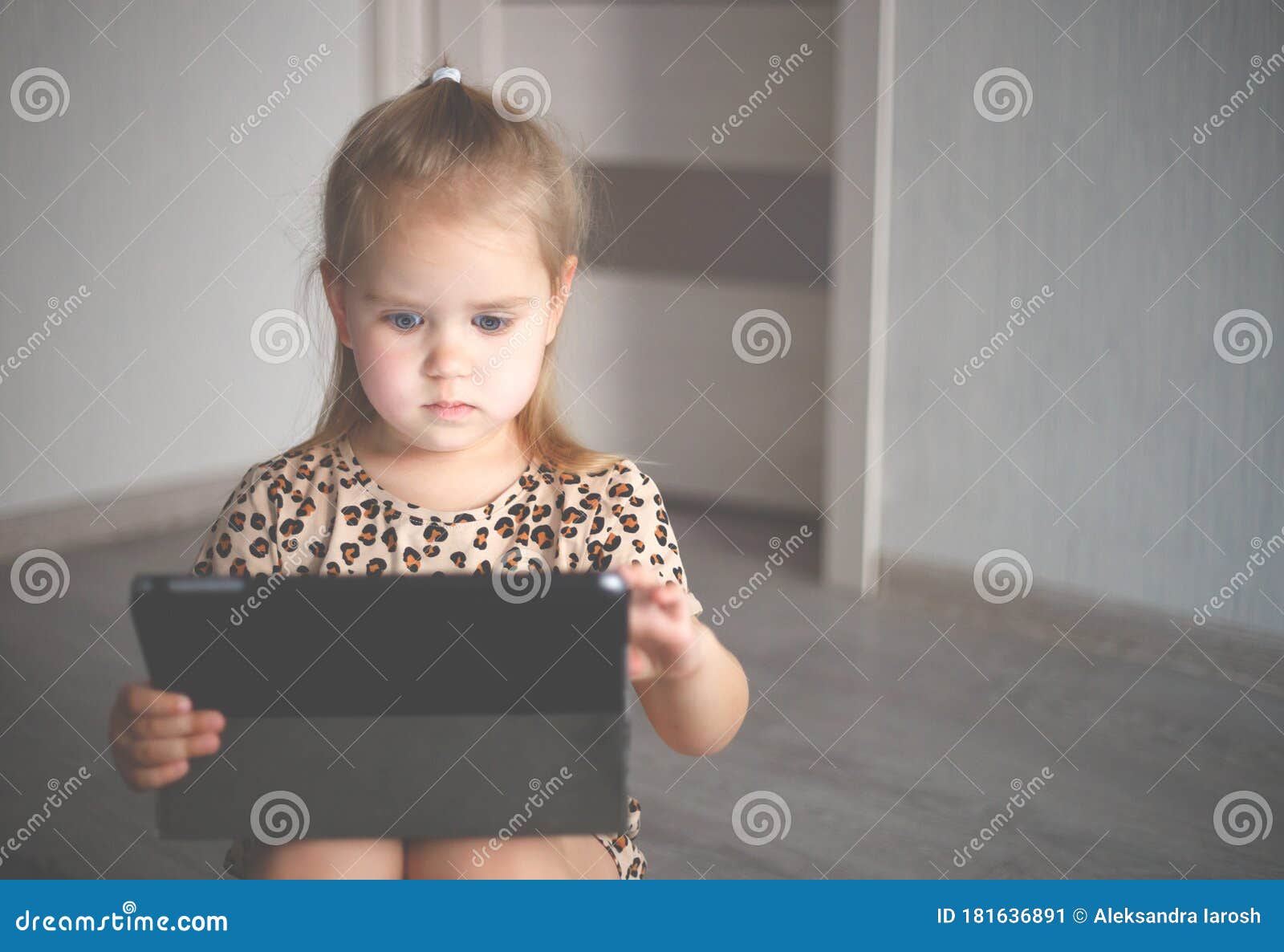 Little Girl at Home Watching Tablet Computer. Home Schooling, Distance ...