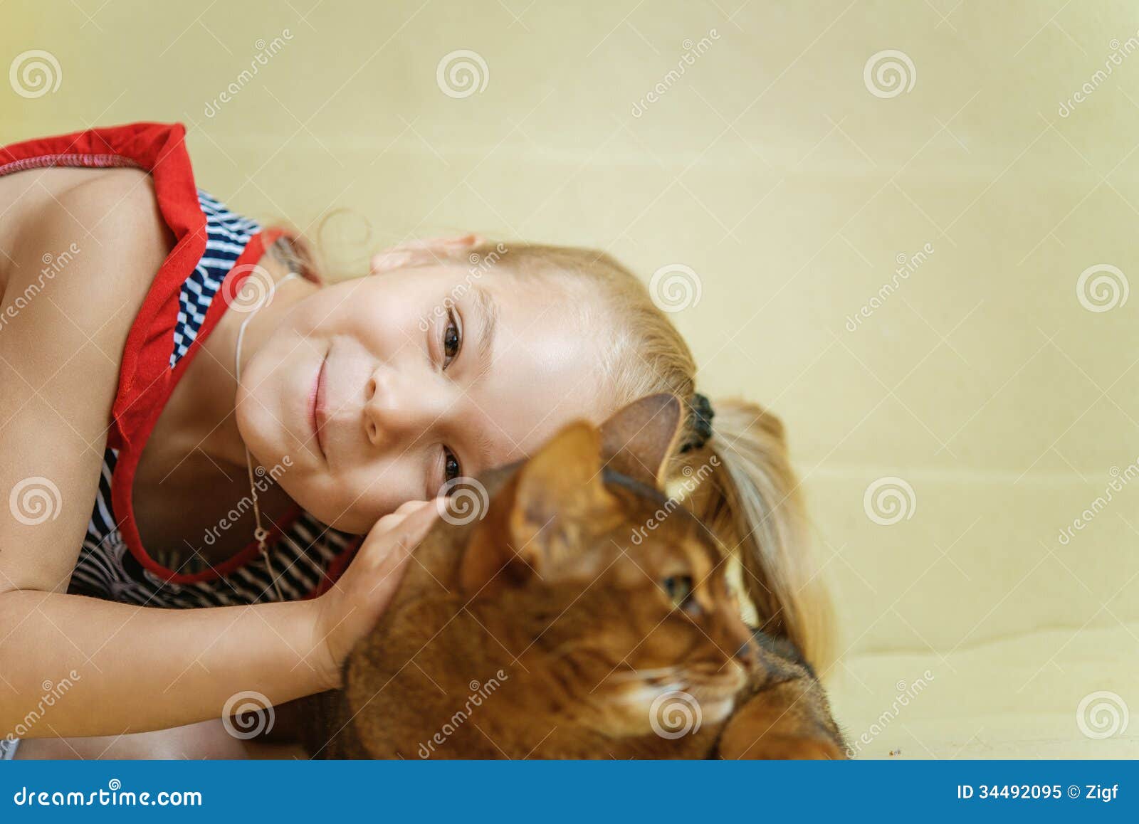 Little girl hugging cat stock image. Image of beautiful - 34492095