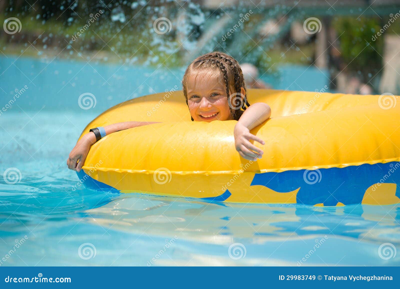 Little Girl Sitting on Inflatable Ring Stock Image - Image of smile ...