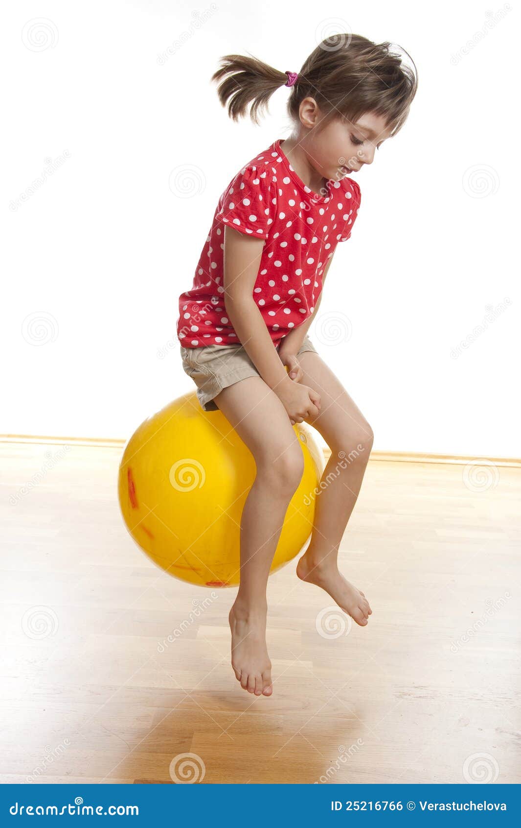 Little Girl Jumping on Ball Stock Photo - Image of adorable, little ...