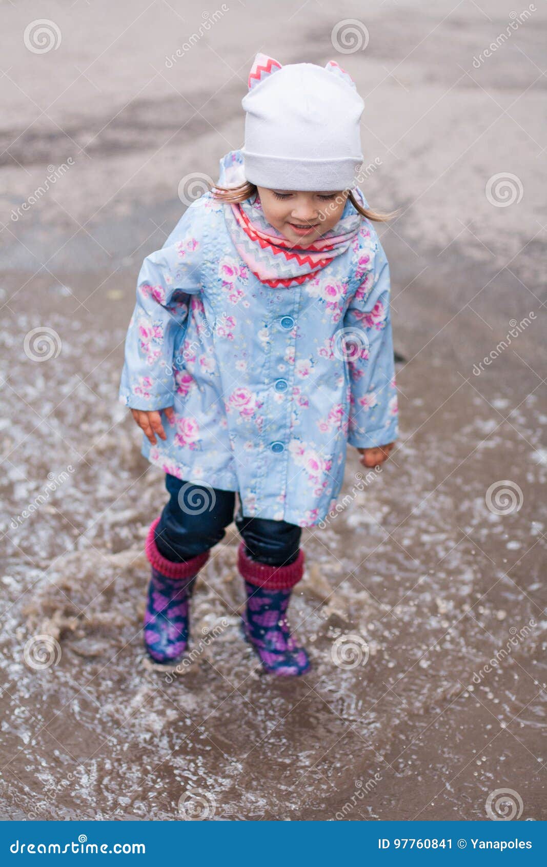 Little Girl Jumping in the Puddle Stock Image - Image of beautiful ...