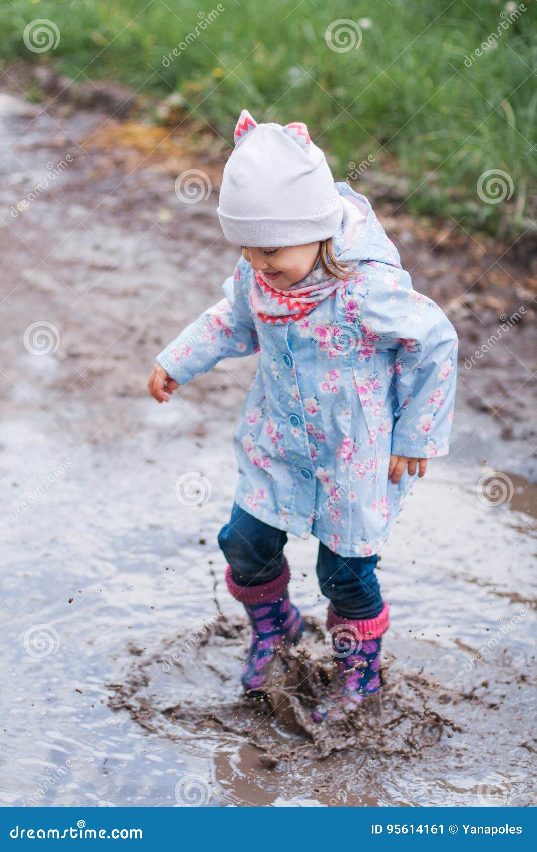 Little Girl Jumping in the Puddle Stock Image - Image of jump, cheerful ...