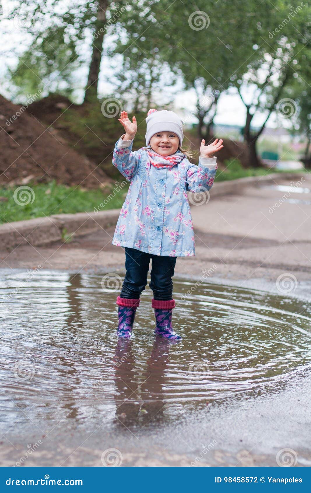 Little Girl Jumping in the Puddle Stock Photo - Image of emotions, play ...
