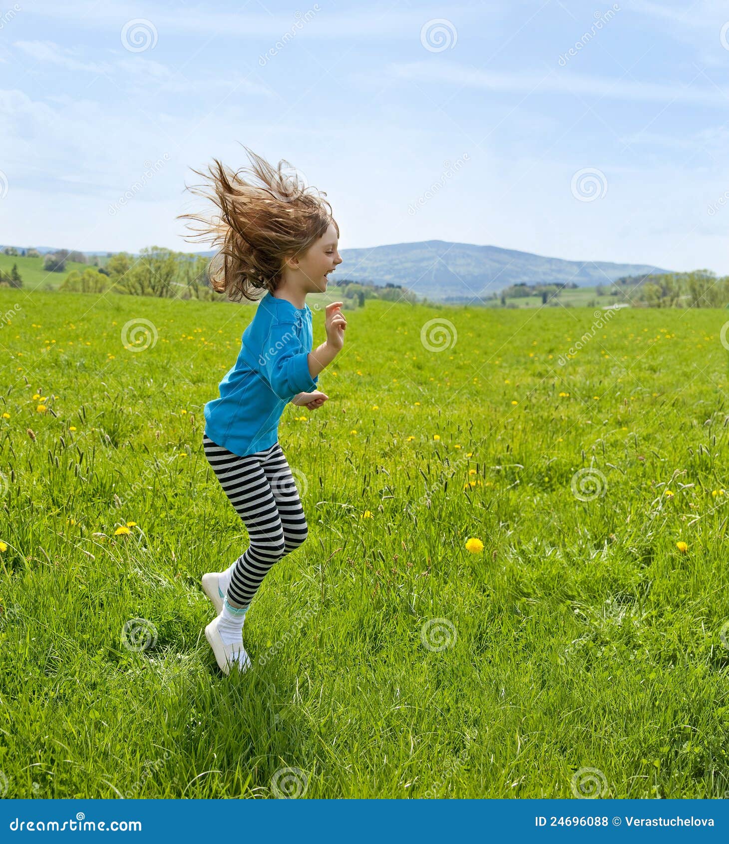 Little Girl Jumping on Spring Meadow Stock Photo - Image of laughing ...
