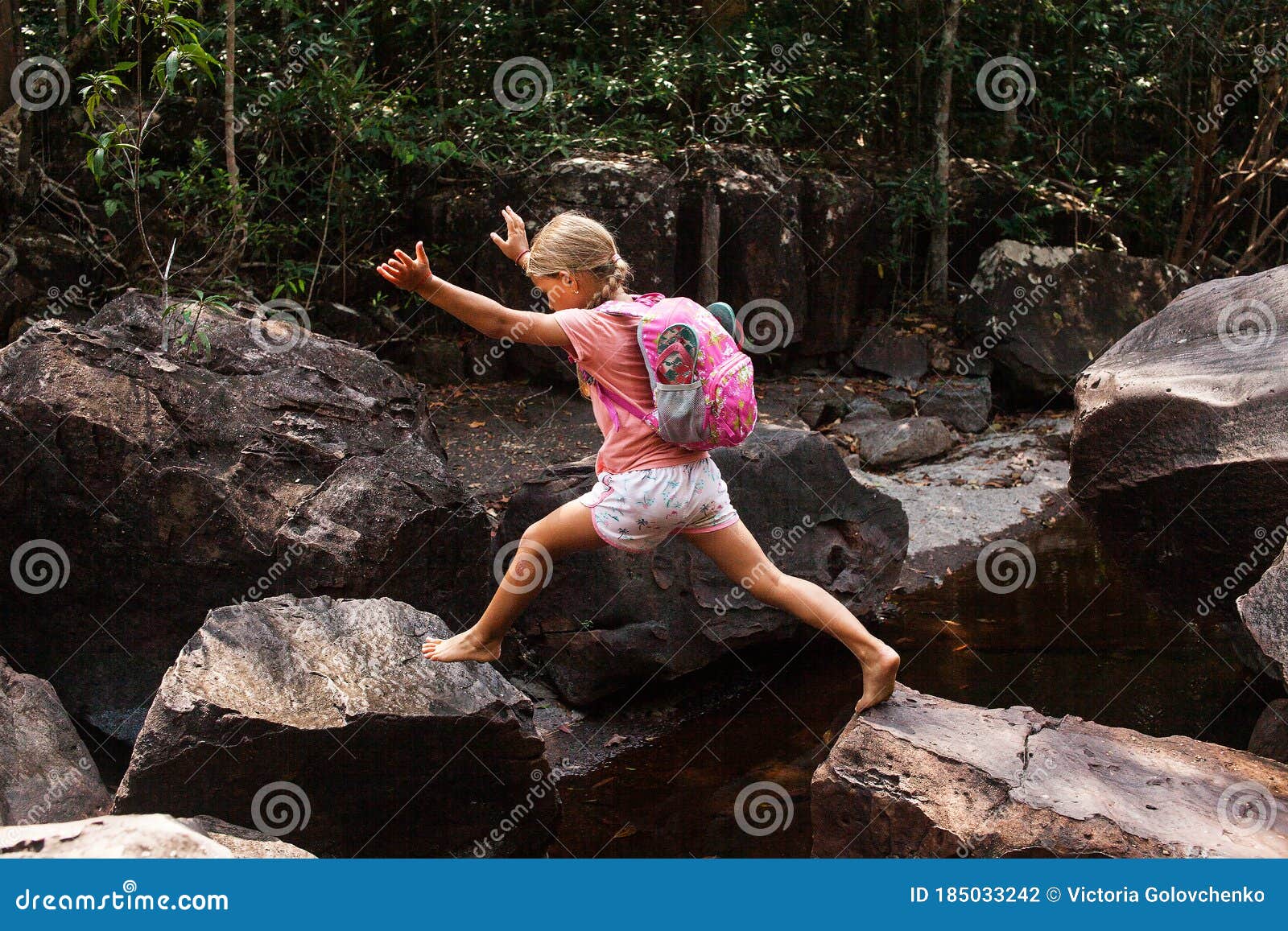 Jumping Stone In Water And Foot Trails In Beach Sand. The Coastline In ...