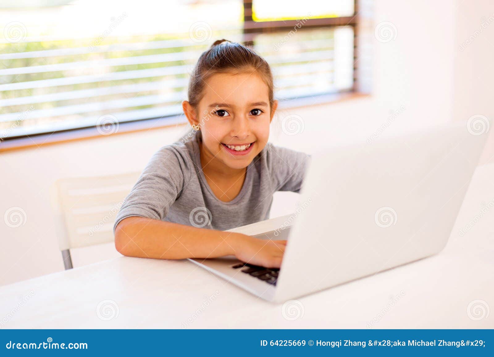 Little girl laptop stock image. Image of joyful, happiness - 64225669