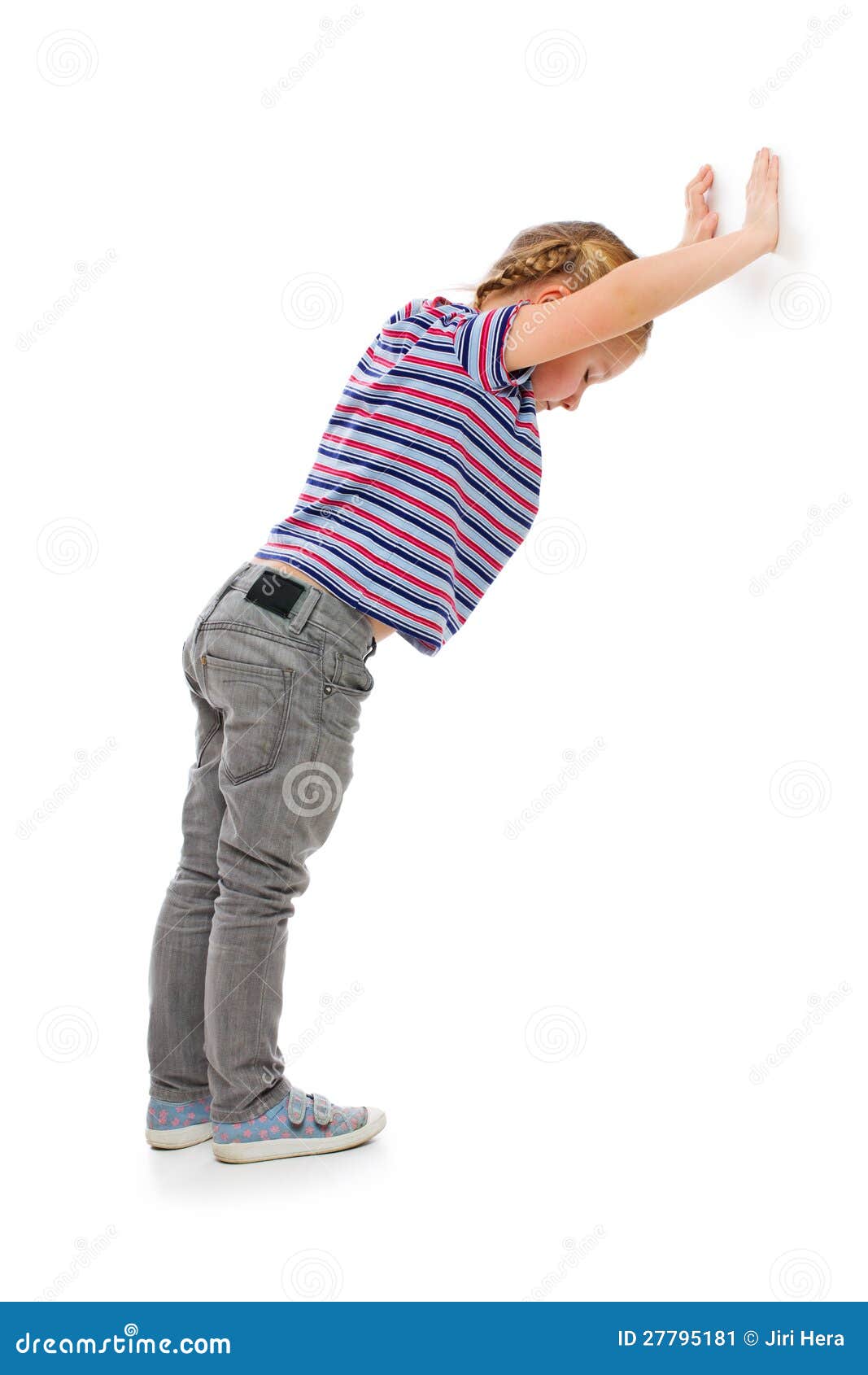 Little Girl Leaning Against a White Wall. Stock Image - Image of ...