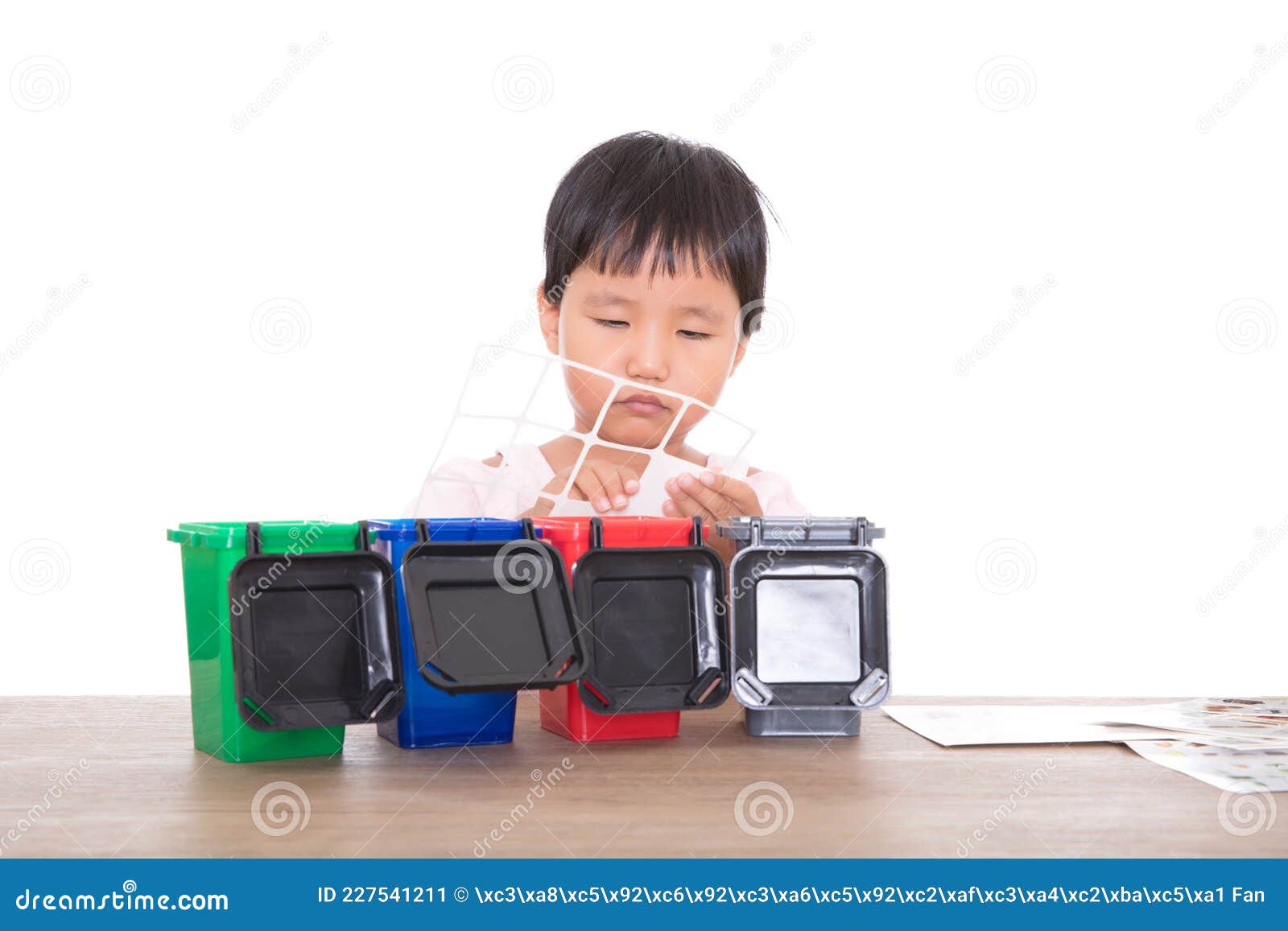 The Little Girl is Learning about Garbage Classification in Front of ...