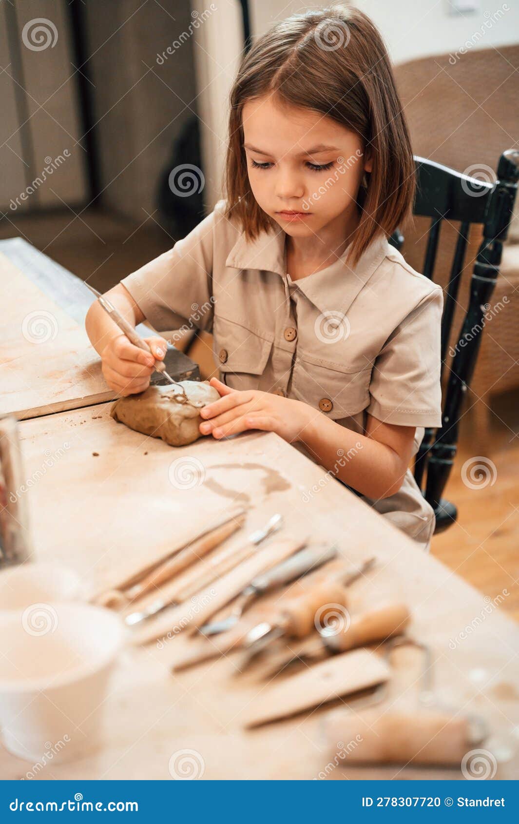 Little Girl is Learning How To Do Pottery in the Workshop Stock Photo ...