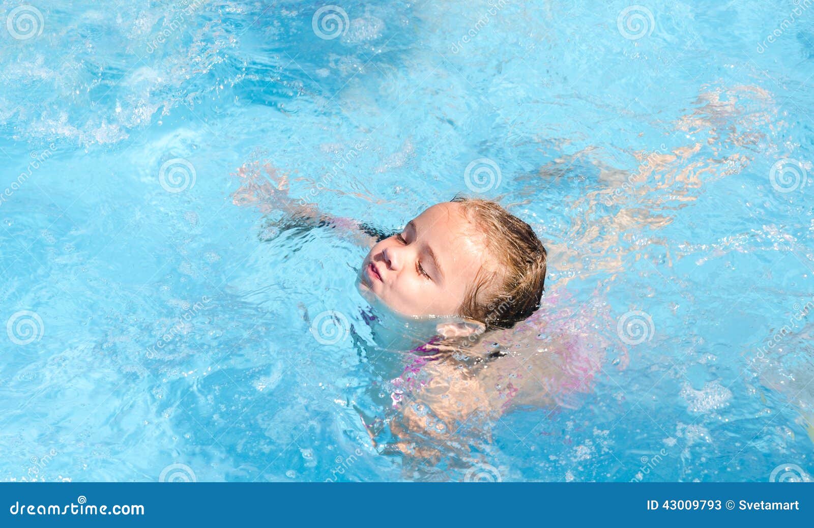 Little Girl Learning To Float Stock Image - Image of child, girl: 43009793