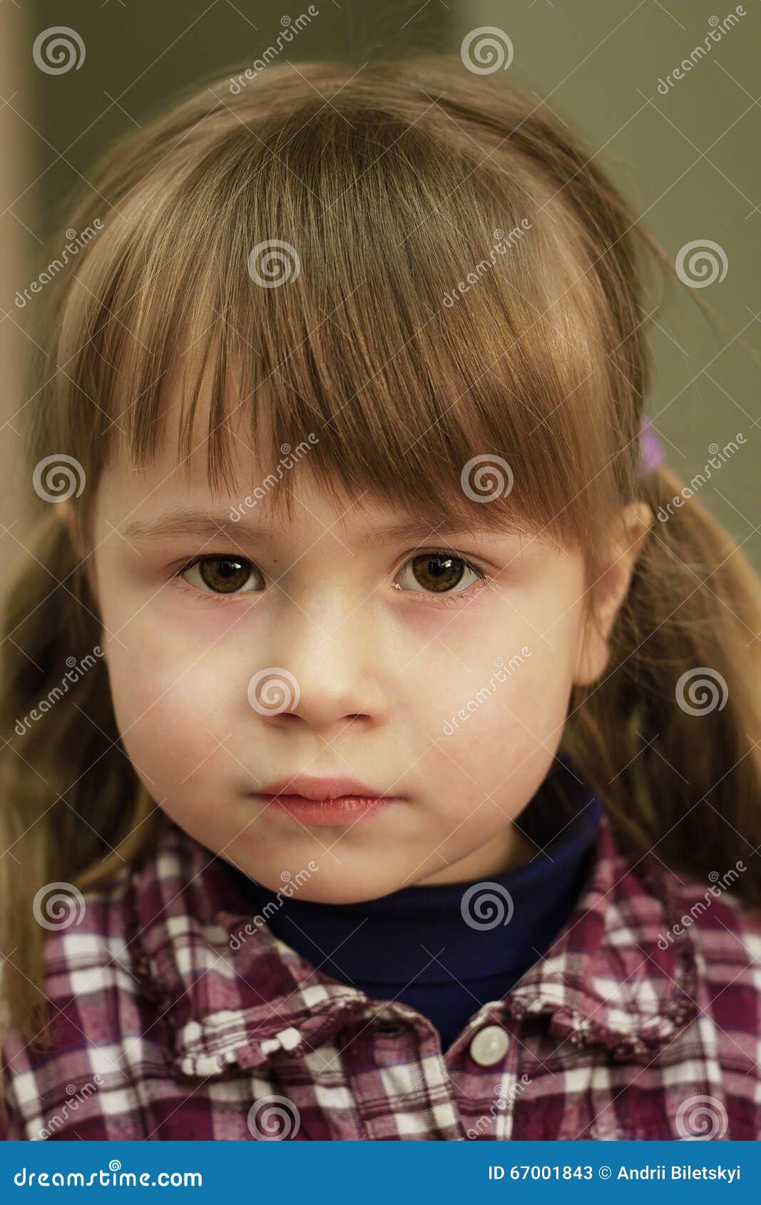Little Girl Looking Straight Ahead Stock Image - Image of shirt, eyes ...