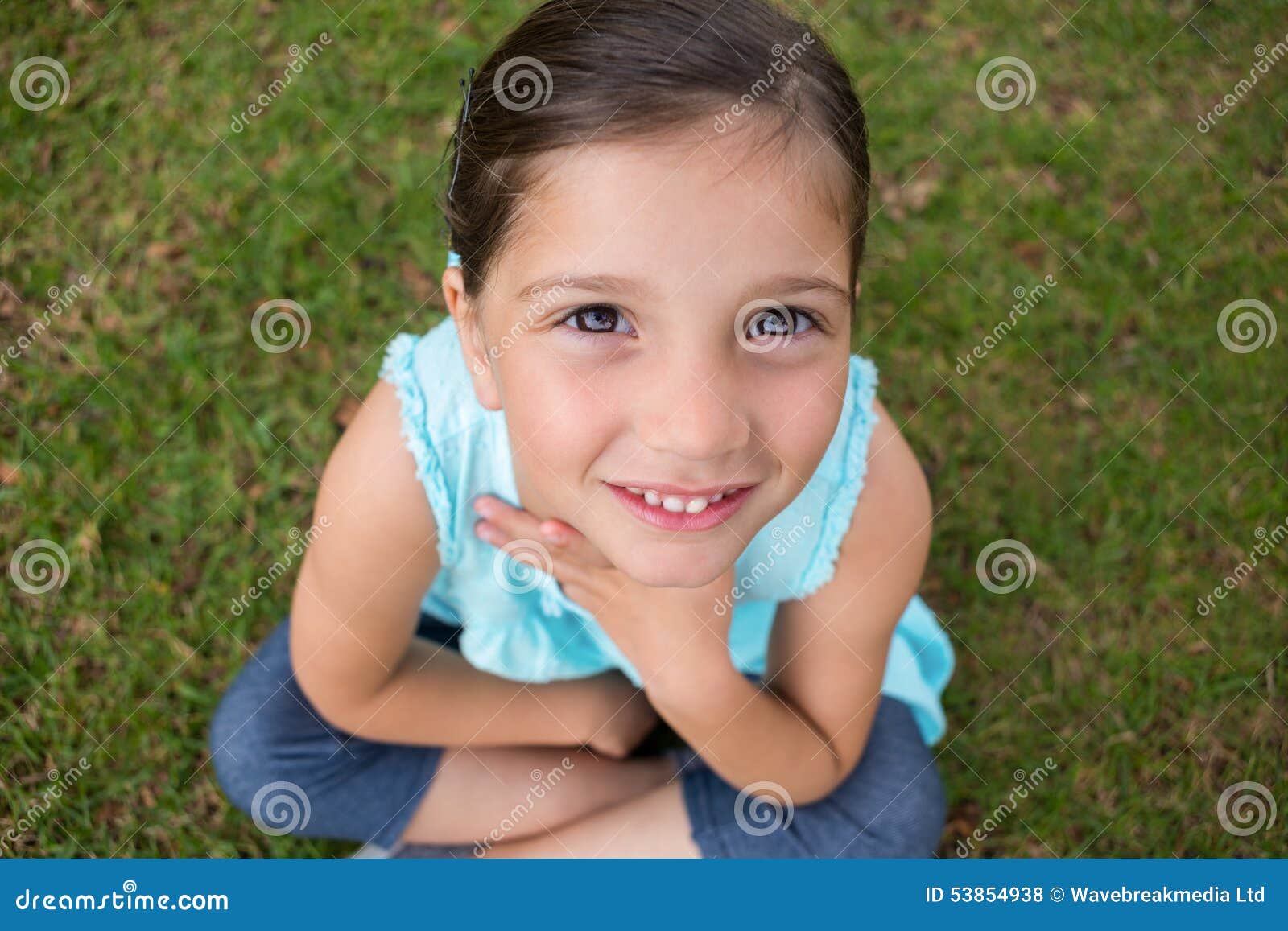 Little Girl Looking Up at Camera Stock Photo - Image of smiling, bright ...