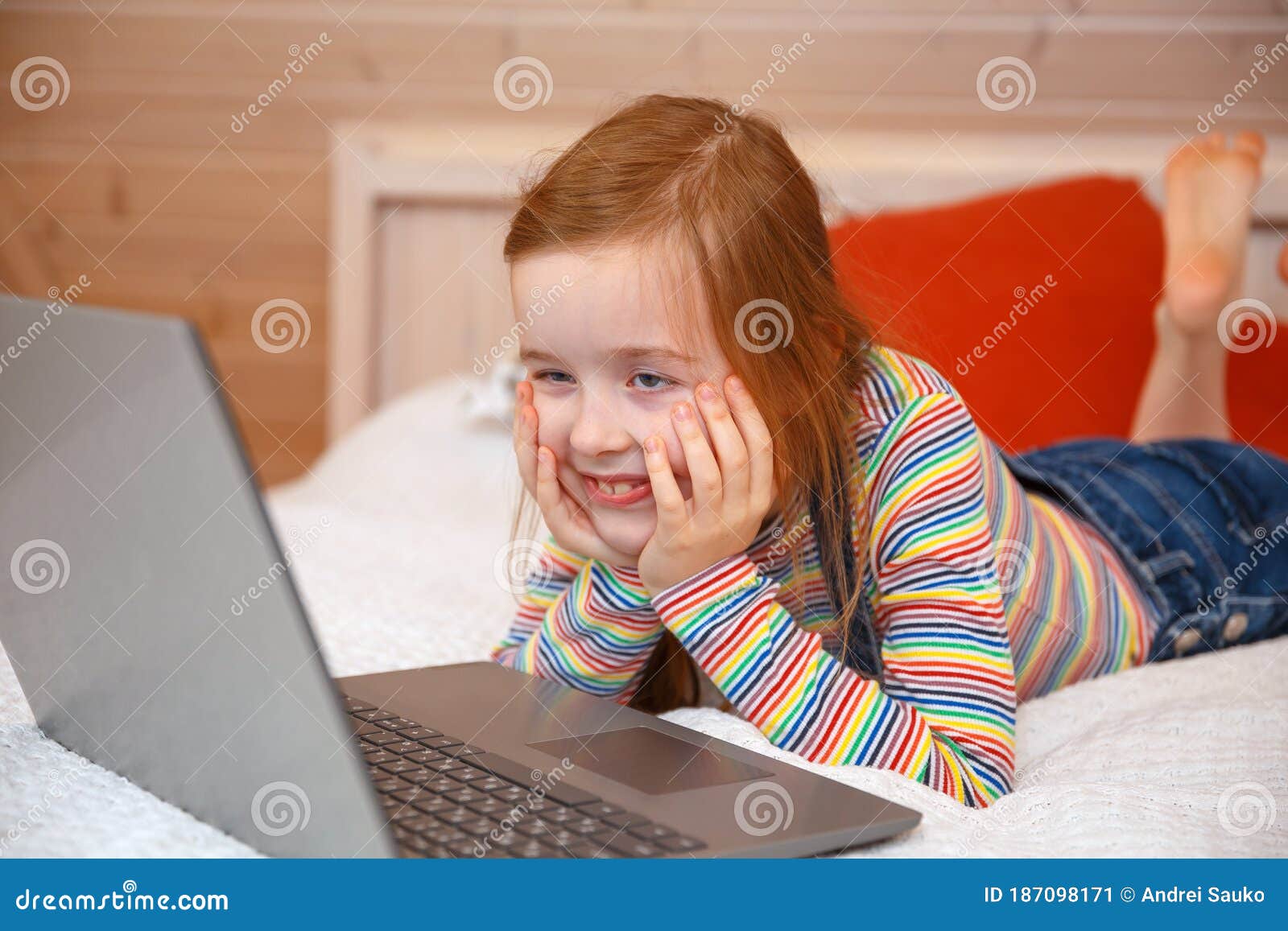 A Little Girl Looks at the Computer with Different Emotions Stock Image ...