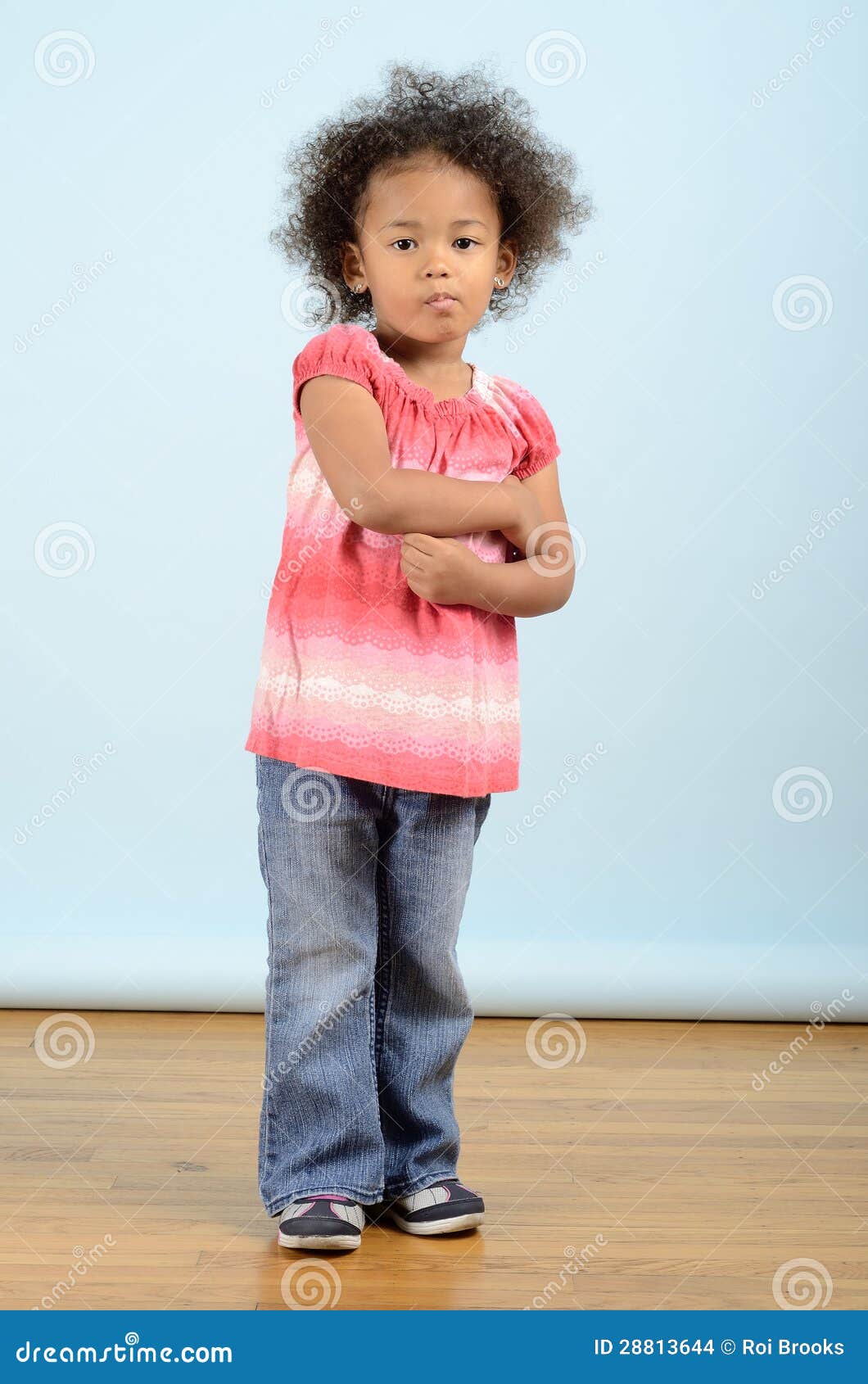 Little Girl Looks Unimpressed Stock Photo - Image of sneakers, young ...