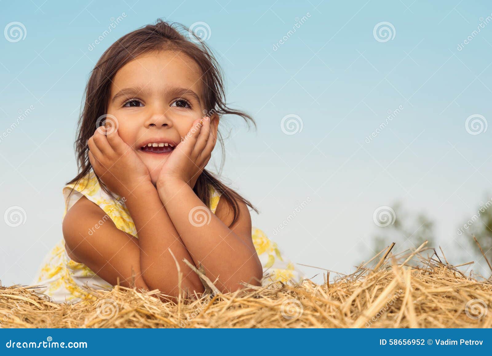 Little Girl Lying on a Haystack Stock Photo - Image of happiness ...