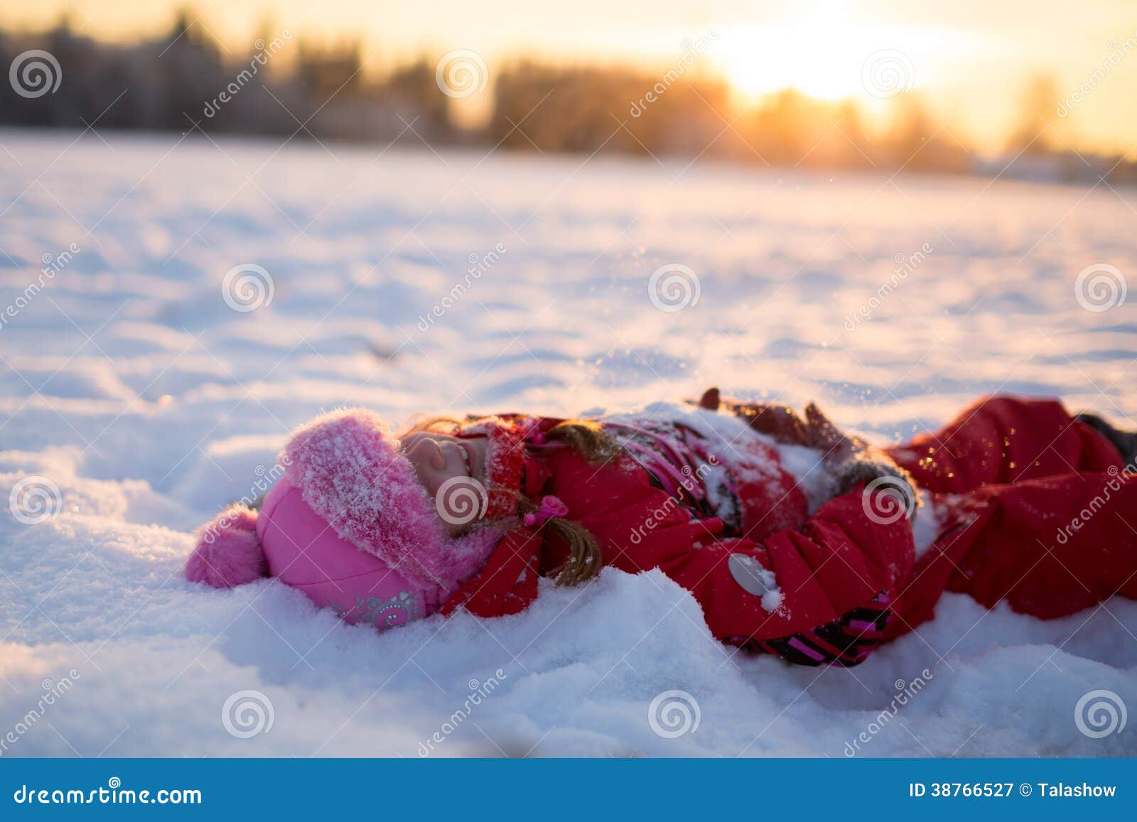 Little Girl Lying in the Snow Stock Image - Image of lifestyle, happy ...