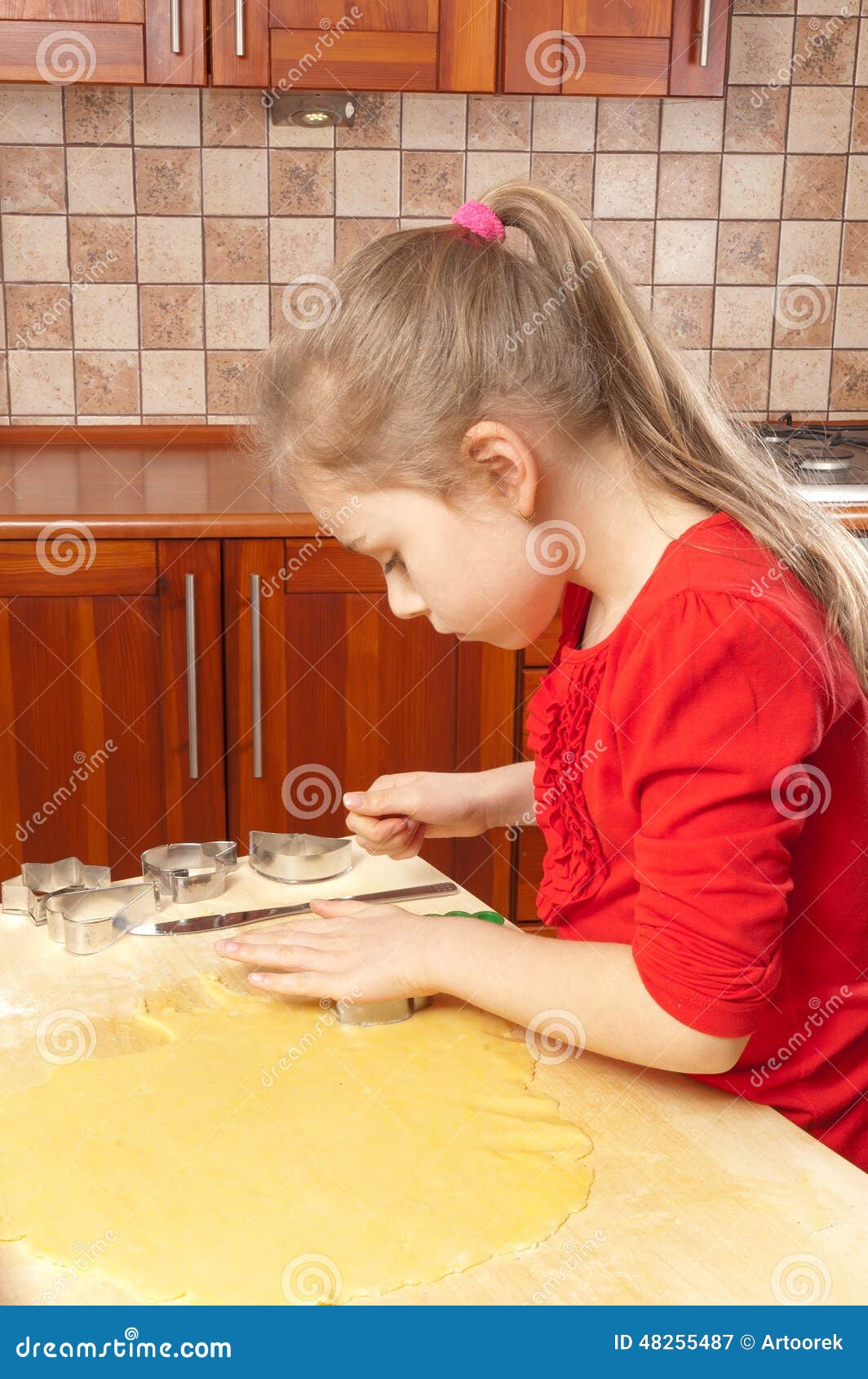 Little girl makes cookies stock image. Image of girl - 48255487