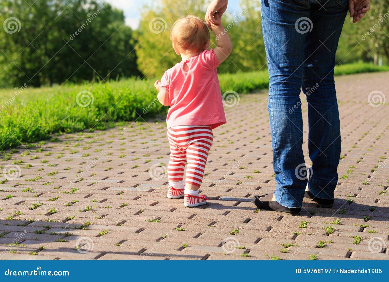 Little Girl Making First Steps in the Park Stock Image - Image of child ...